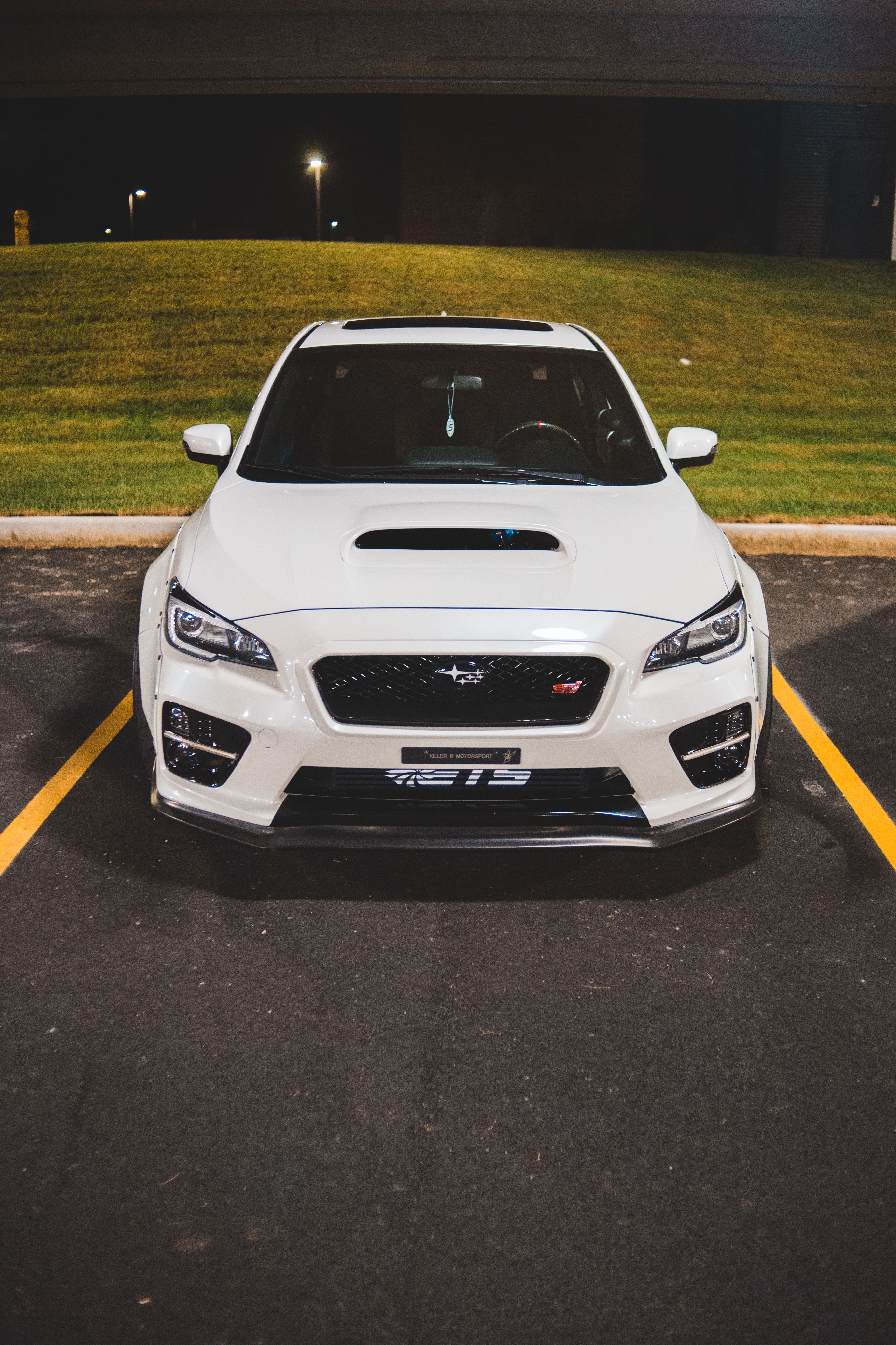 Luxury white car on parking lot · Free Stock Photo