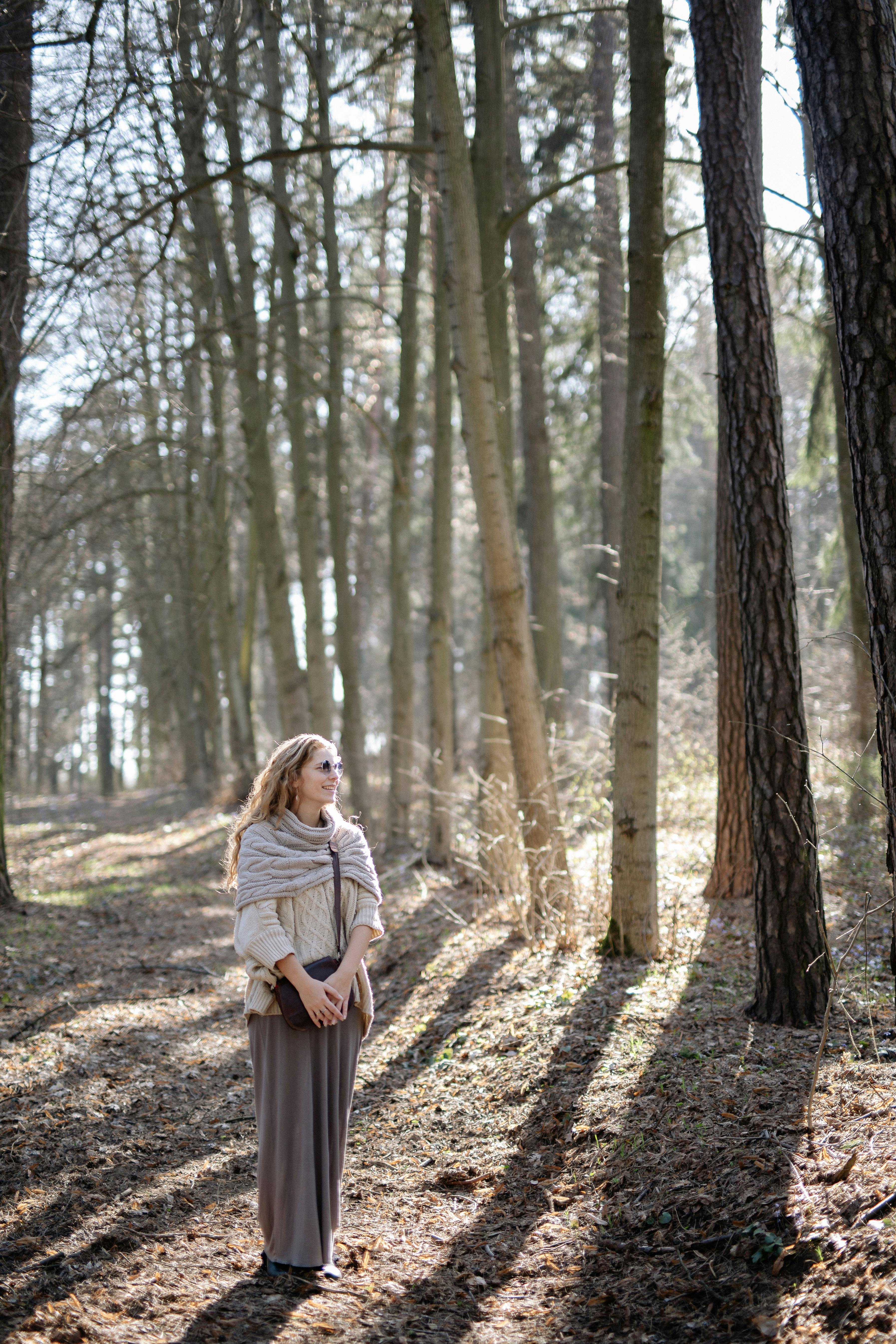 Woman on a Walk in the Woods on a Sunny Day · Free Stock Photo