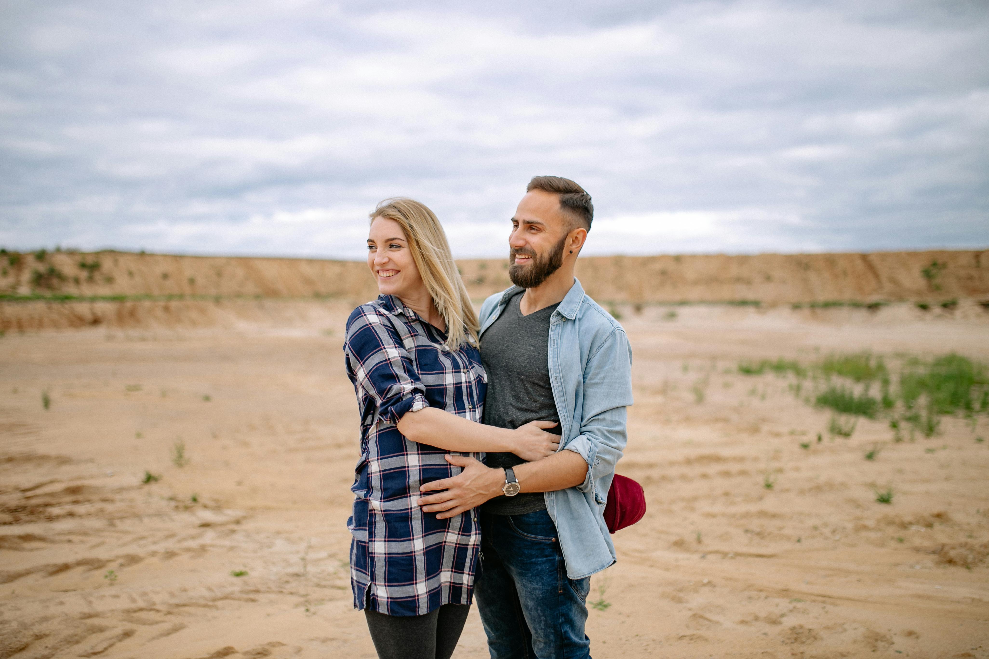 Couple Hugging in Cornfield · Free Stock Photo