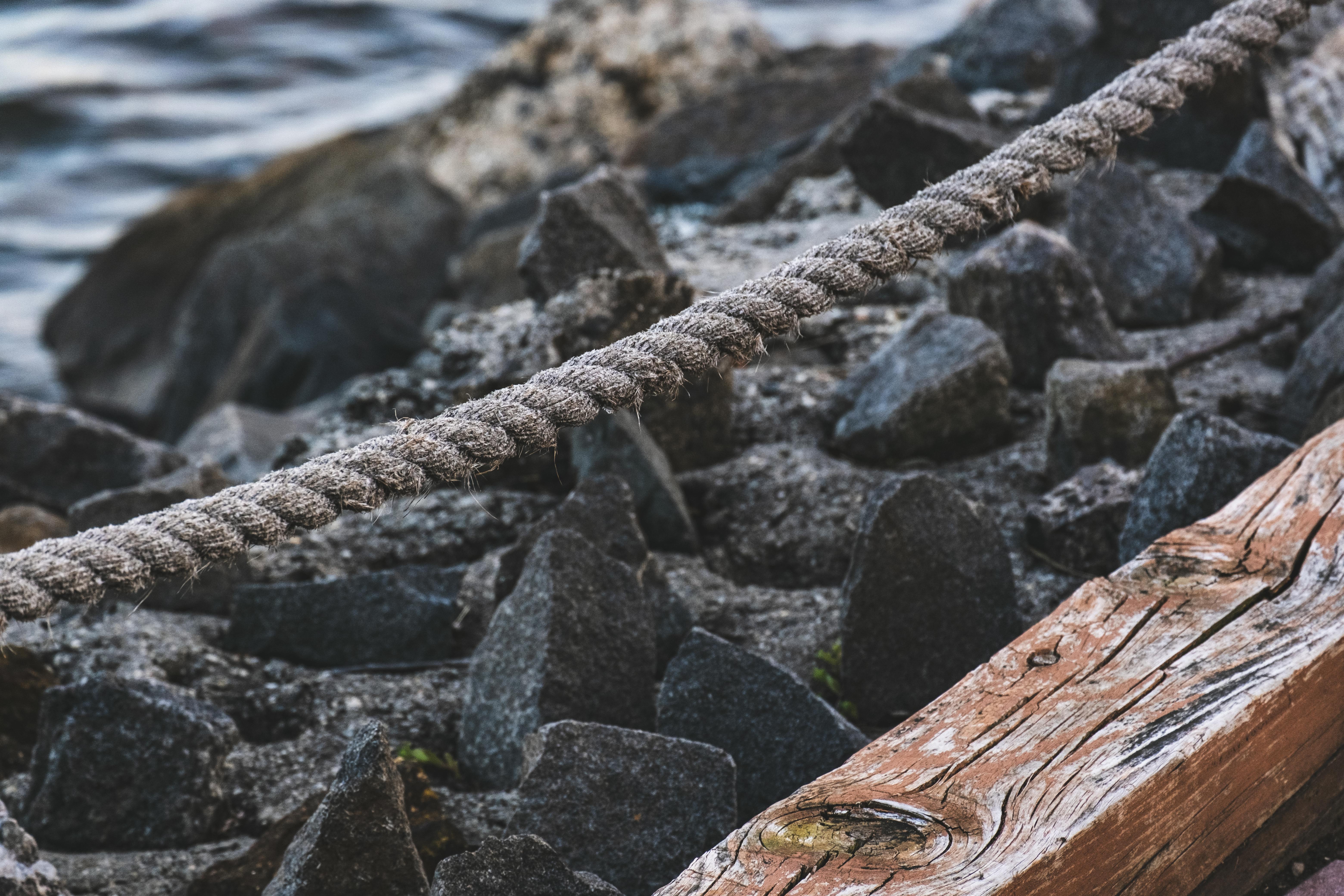 Close up Shot of a Rope and Brown Wooden Log · Free Stock Photo