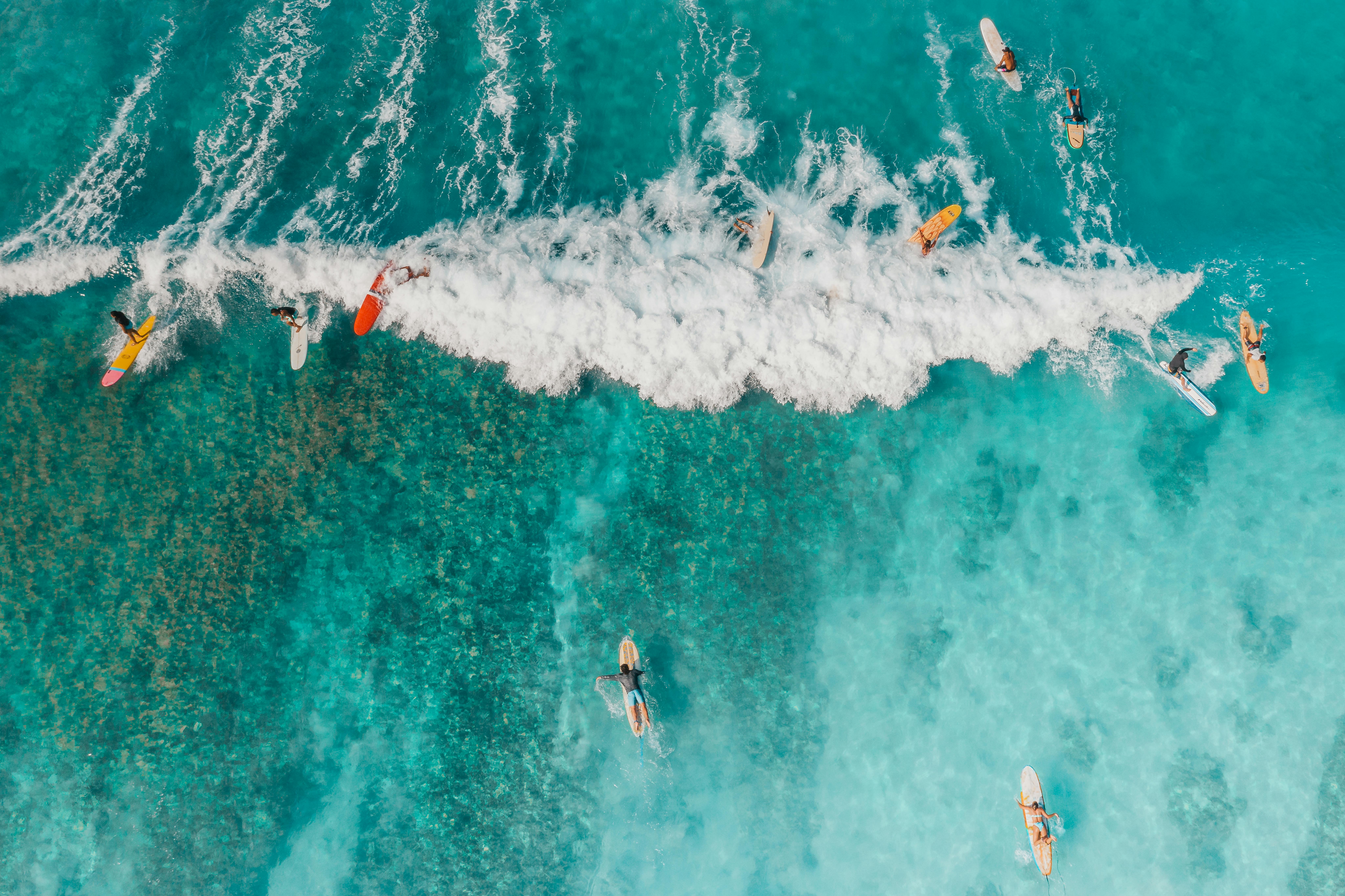 Top View of a People Doing Surfing Together · Free Stock Photo