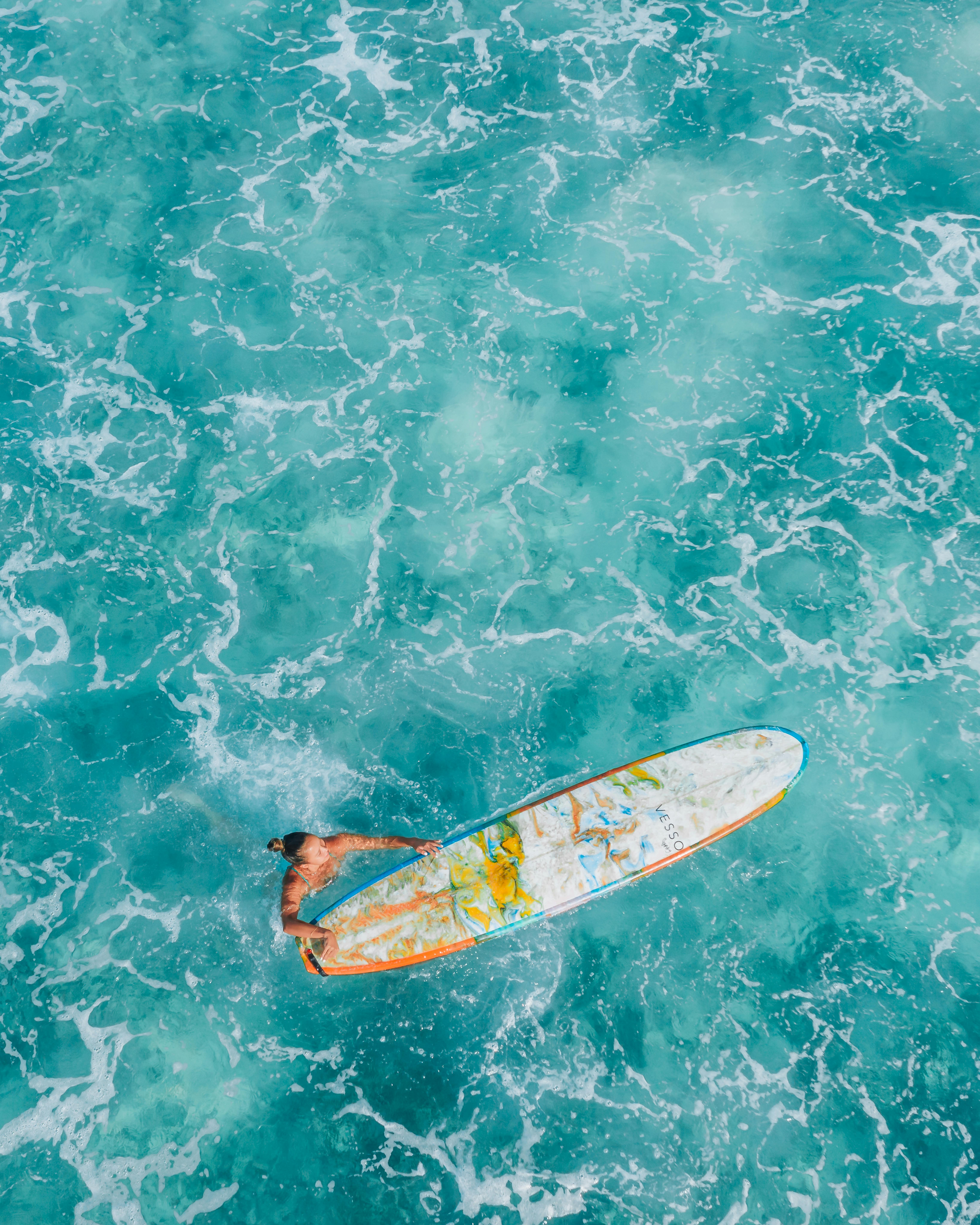 Top View of Surfers on Sea · Free Stock Photo
