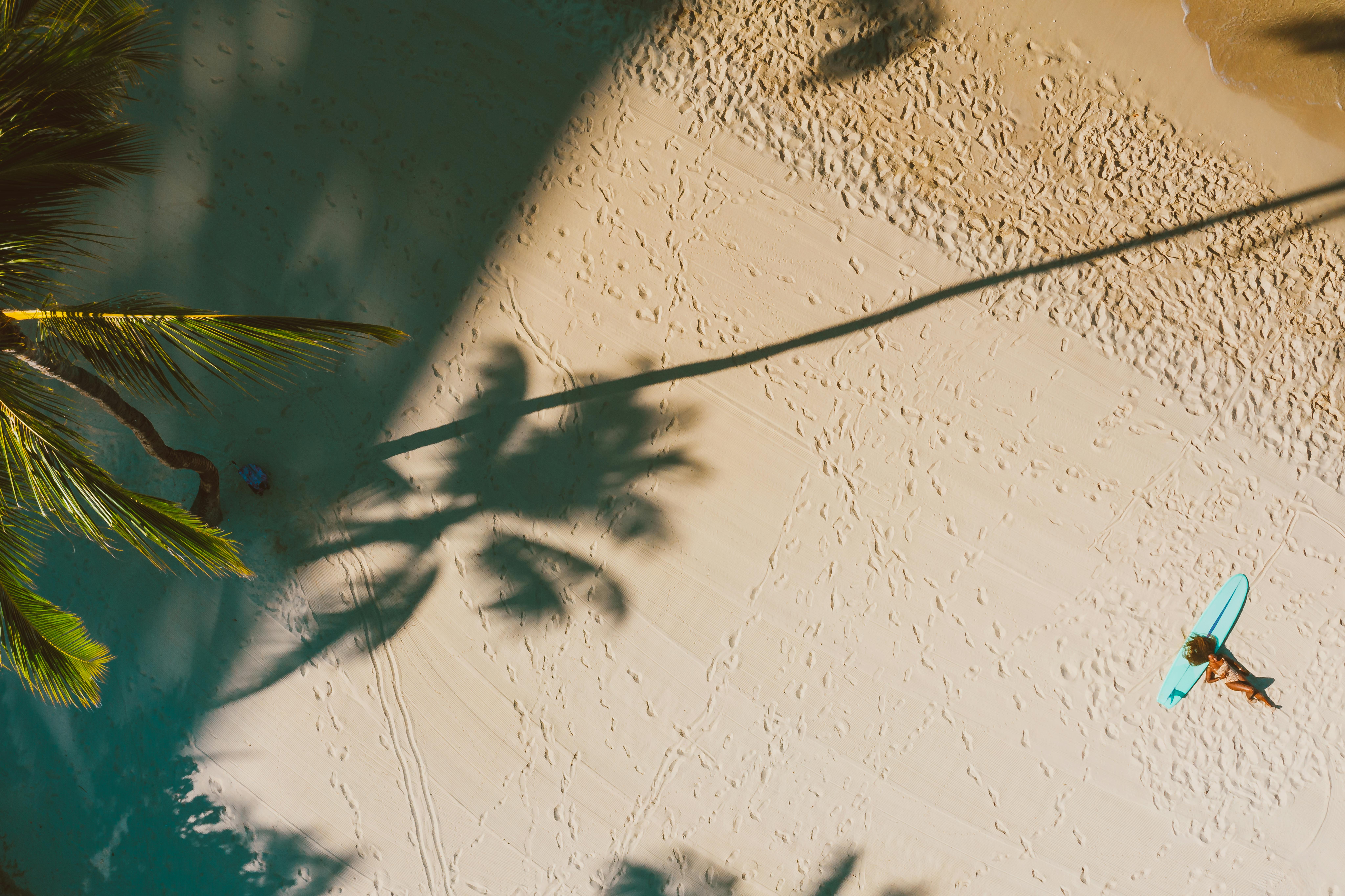 Birds Eye View on Woman Lying on the Beach · Free Stock Photo