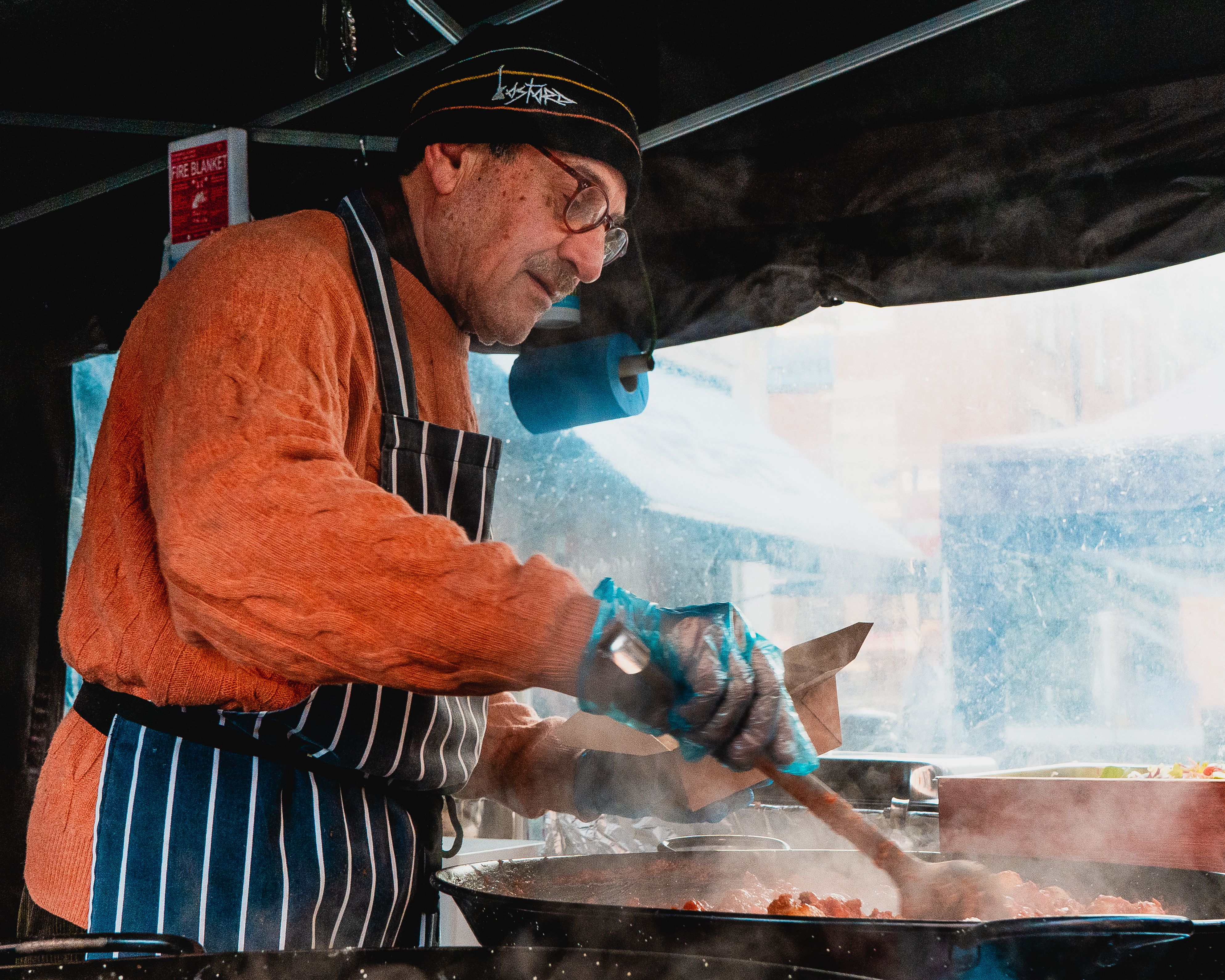An Elderly Man Cooking · Free Stock Photo