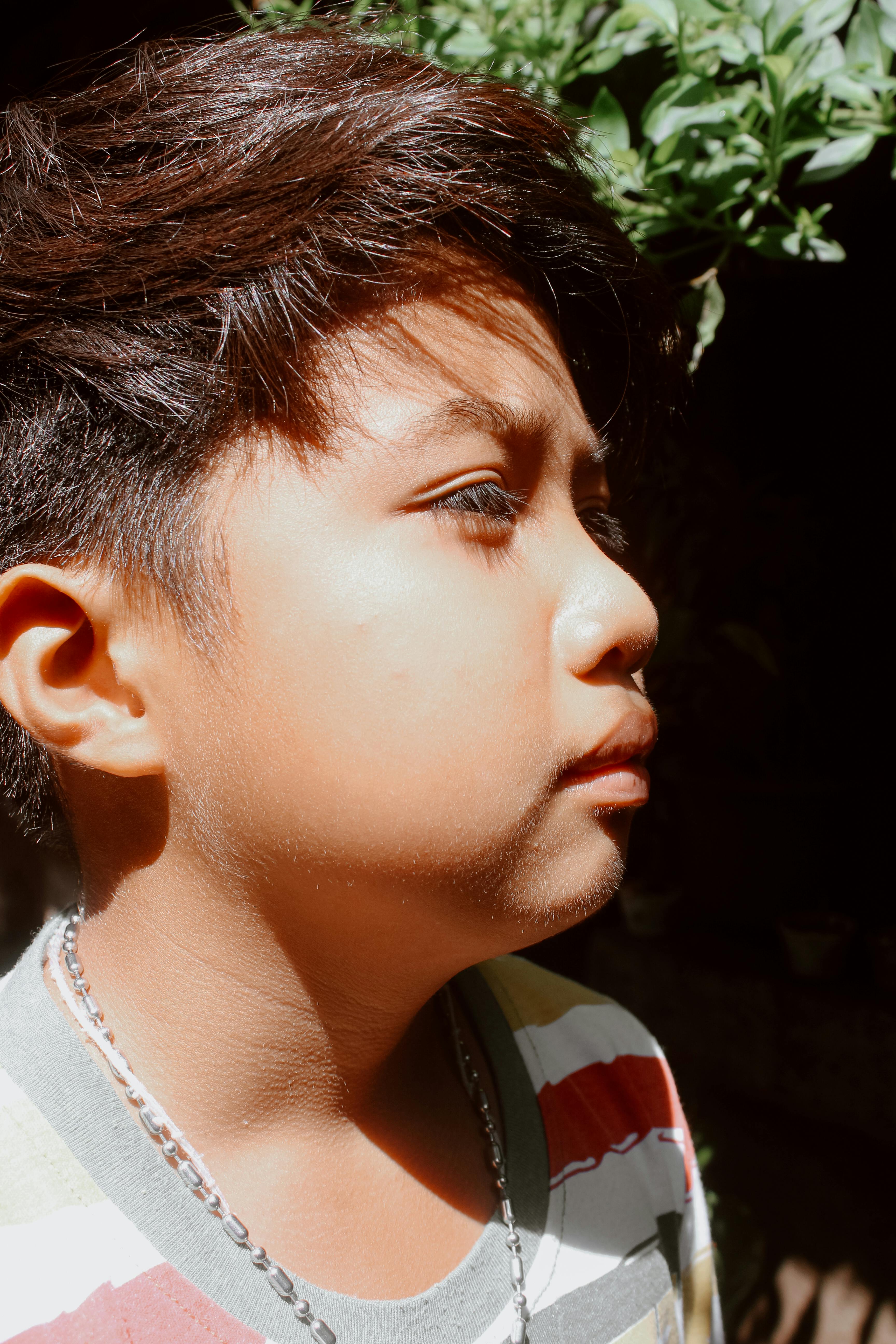 Boy with Eyes Closed · Free Stock Photo