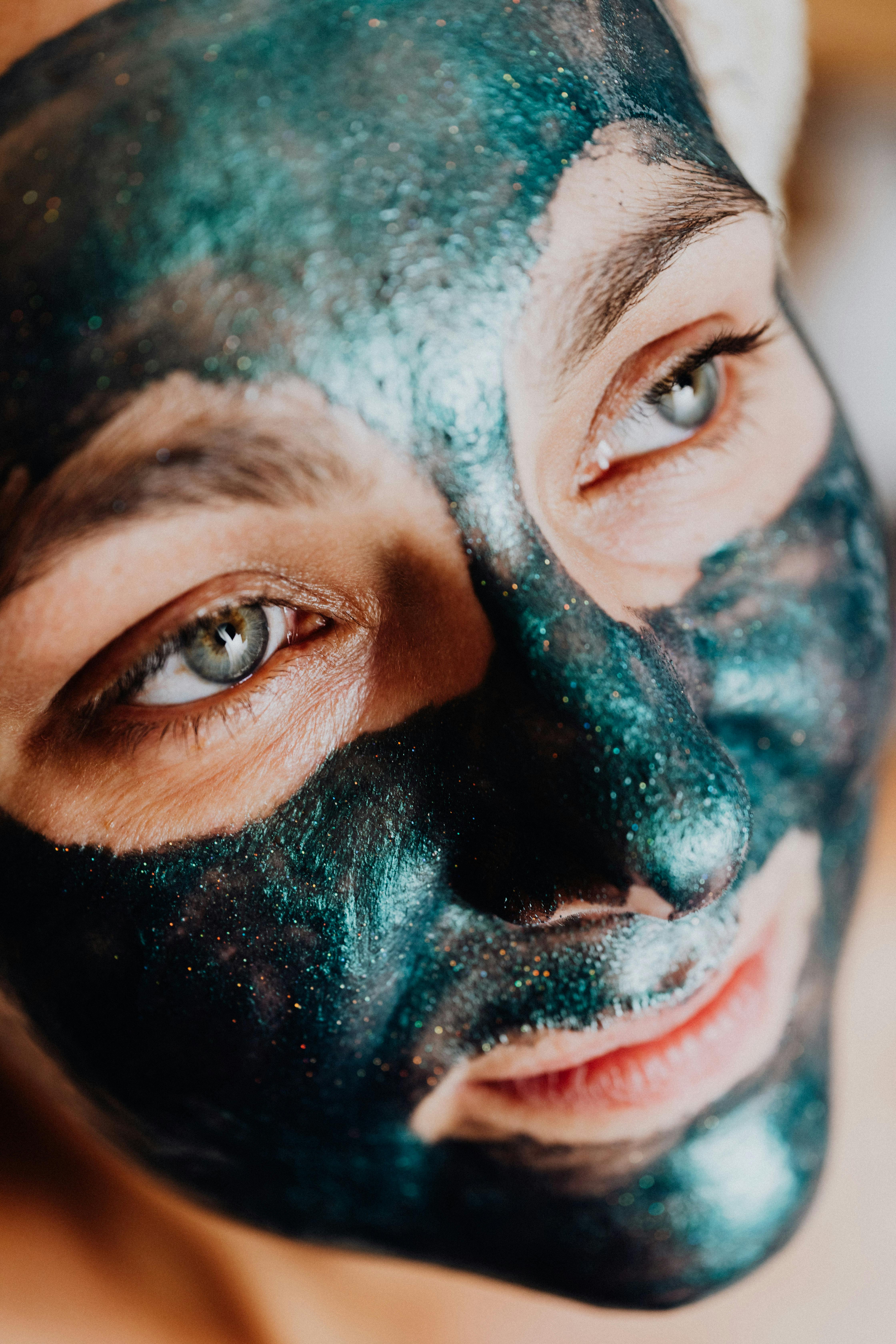 Person With Blue and Black Paint on Face · Free Stock Photo