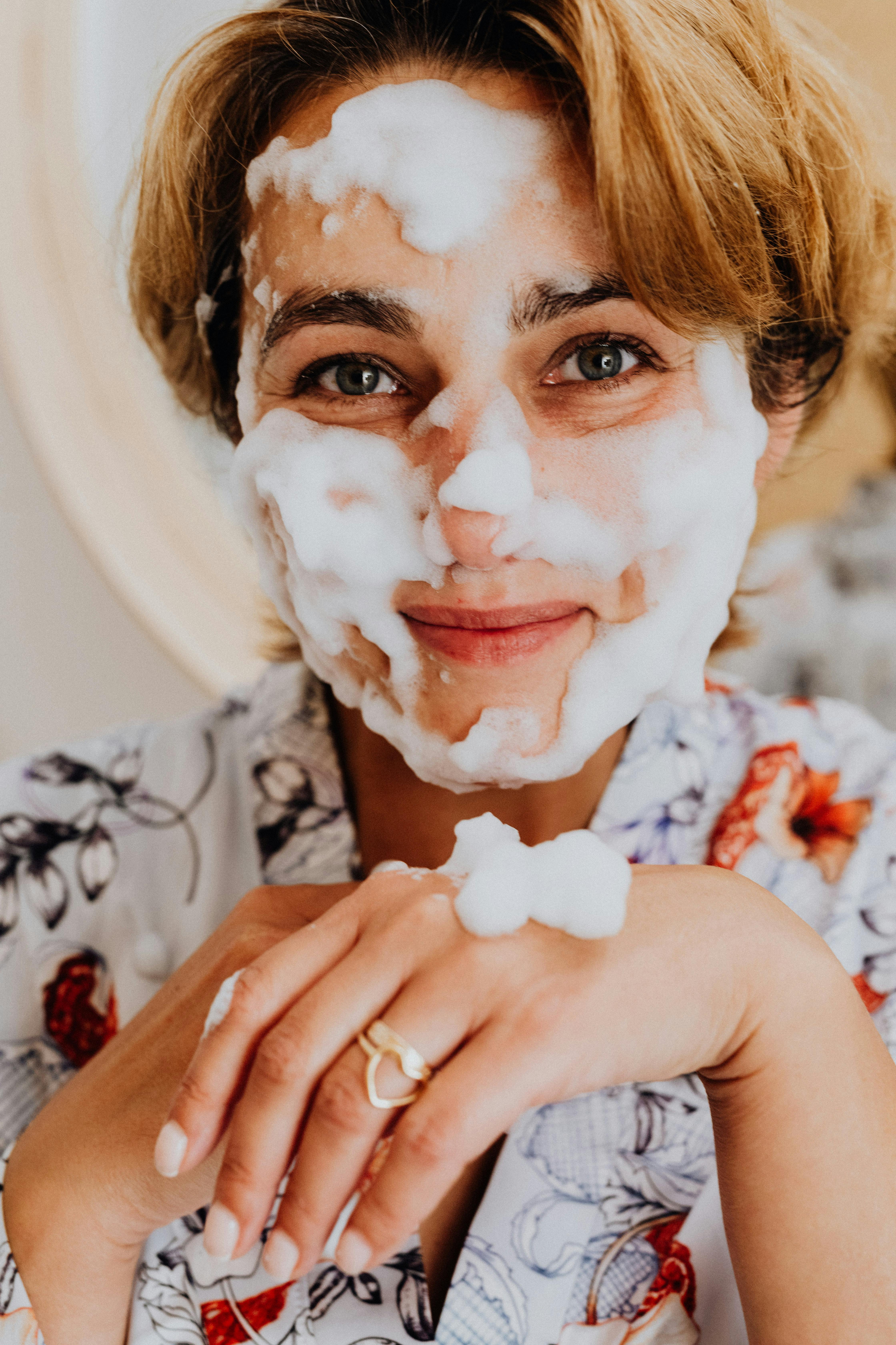Portrait of a Woman with Foam on Her Face · Free Stock Photo