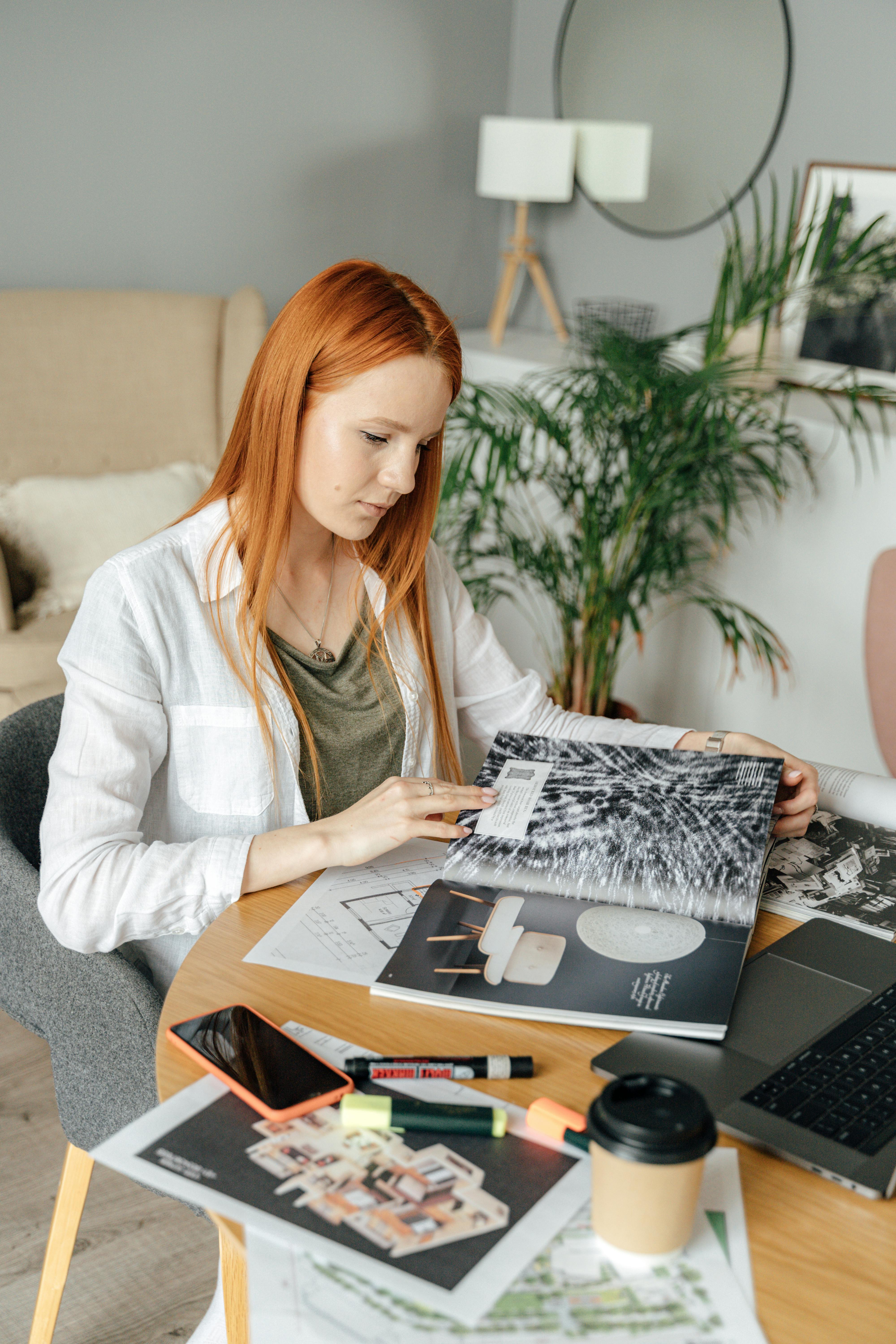 Woman Reading Magazine · Free Stock Photo