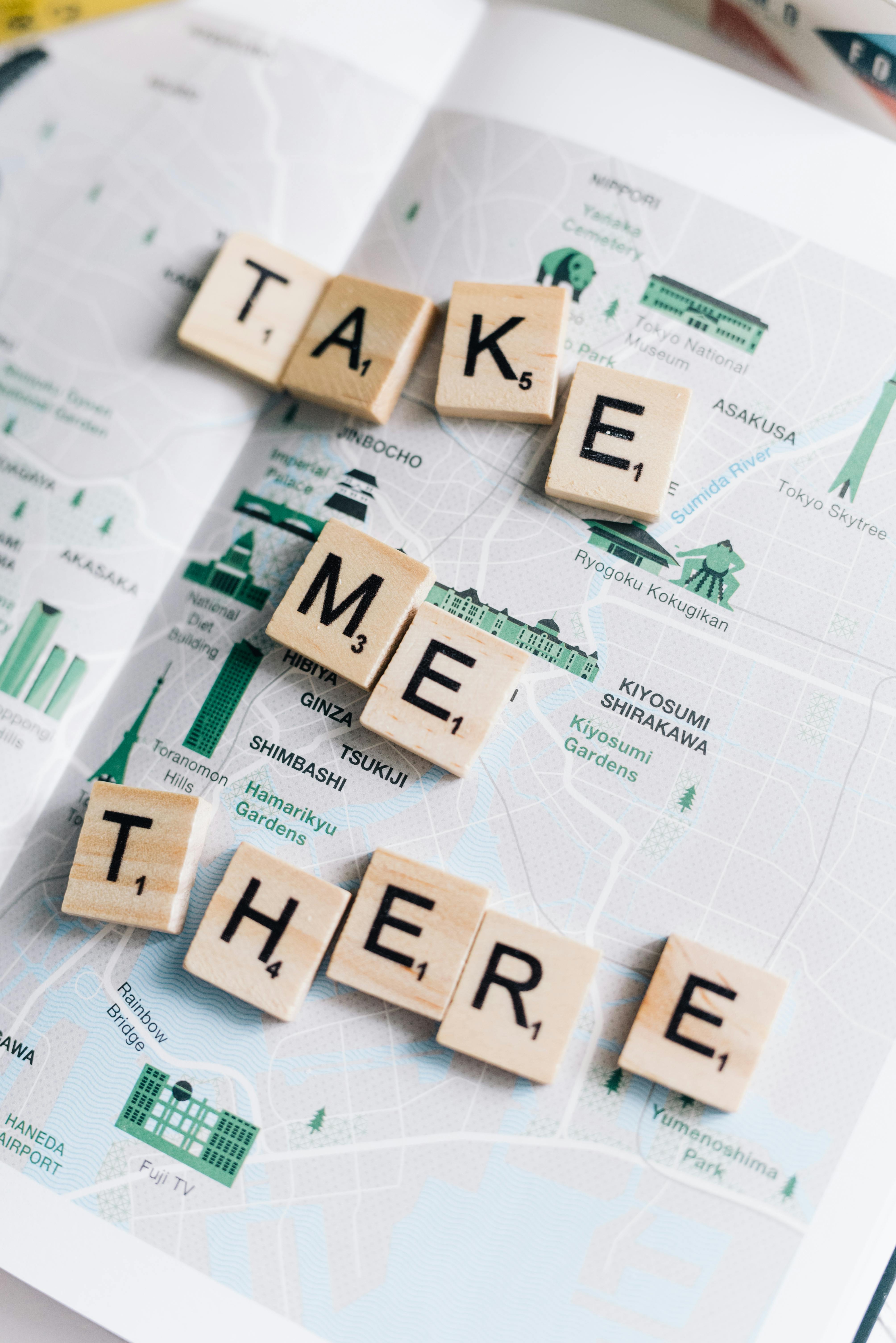 A Word Arranged with Scrabble Letter Tiles · Free Stock Photo