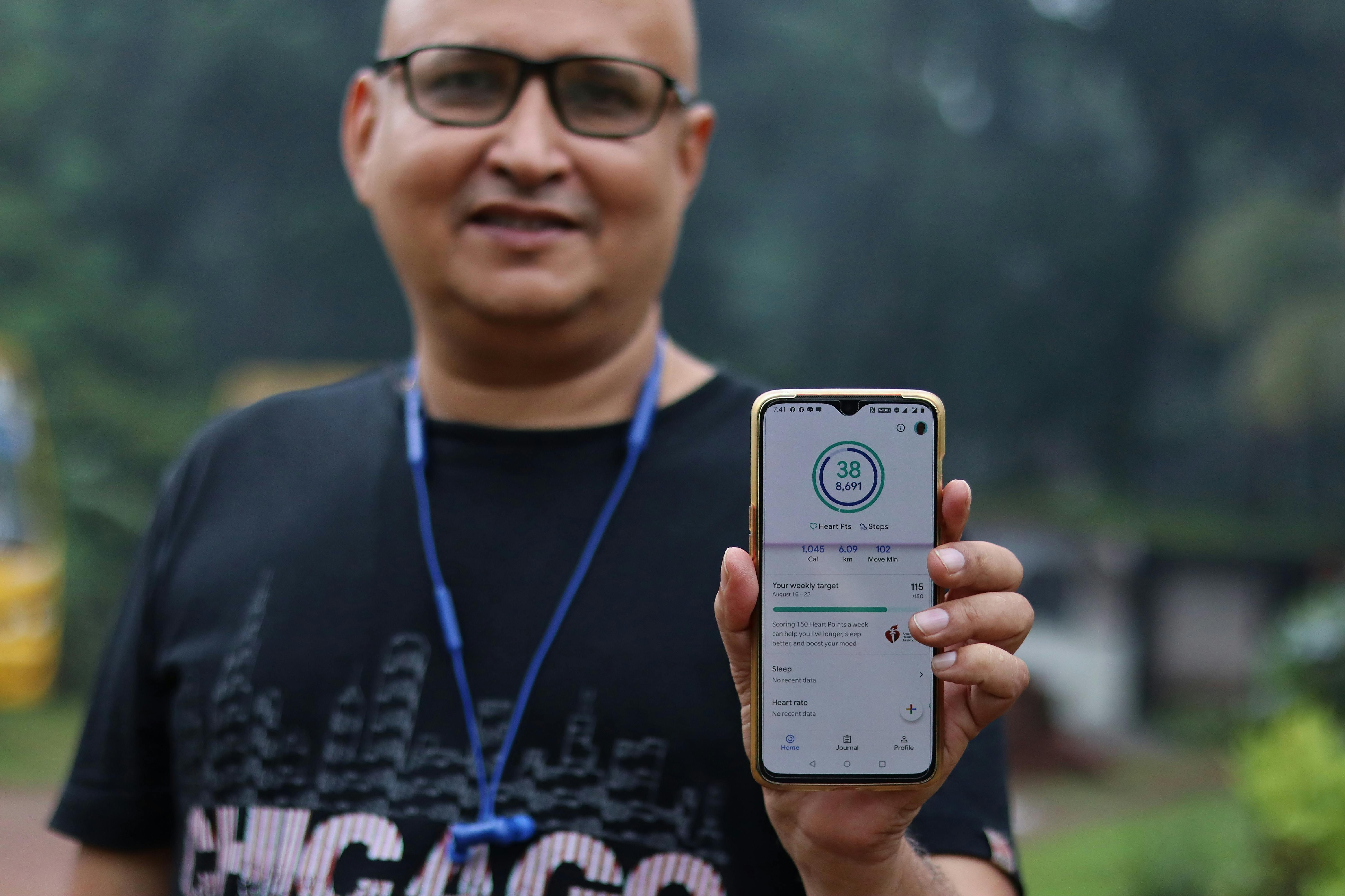 A Man Recording Himself Using His Phone · Free Stock Photo