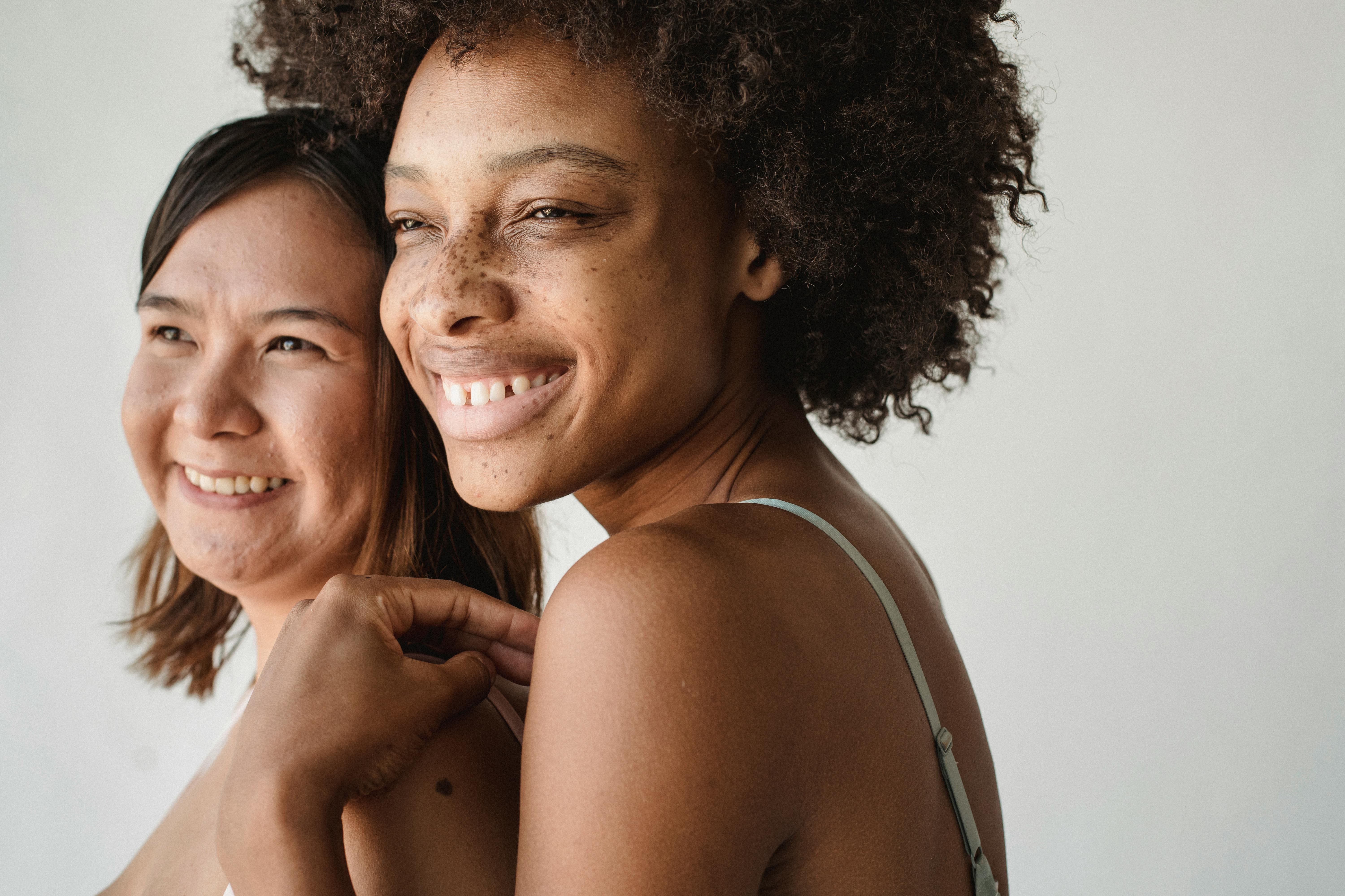 Portrait of Two Women on a White Background · Free Stock Photo