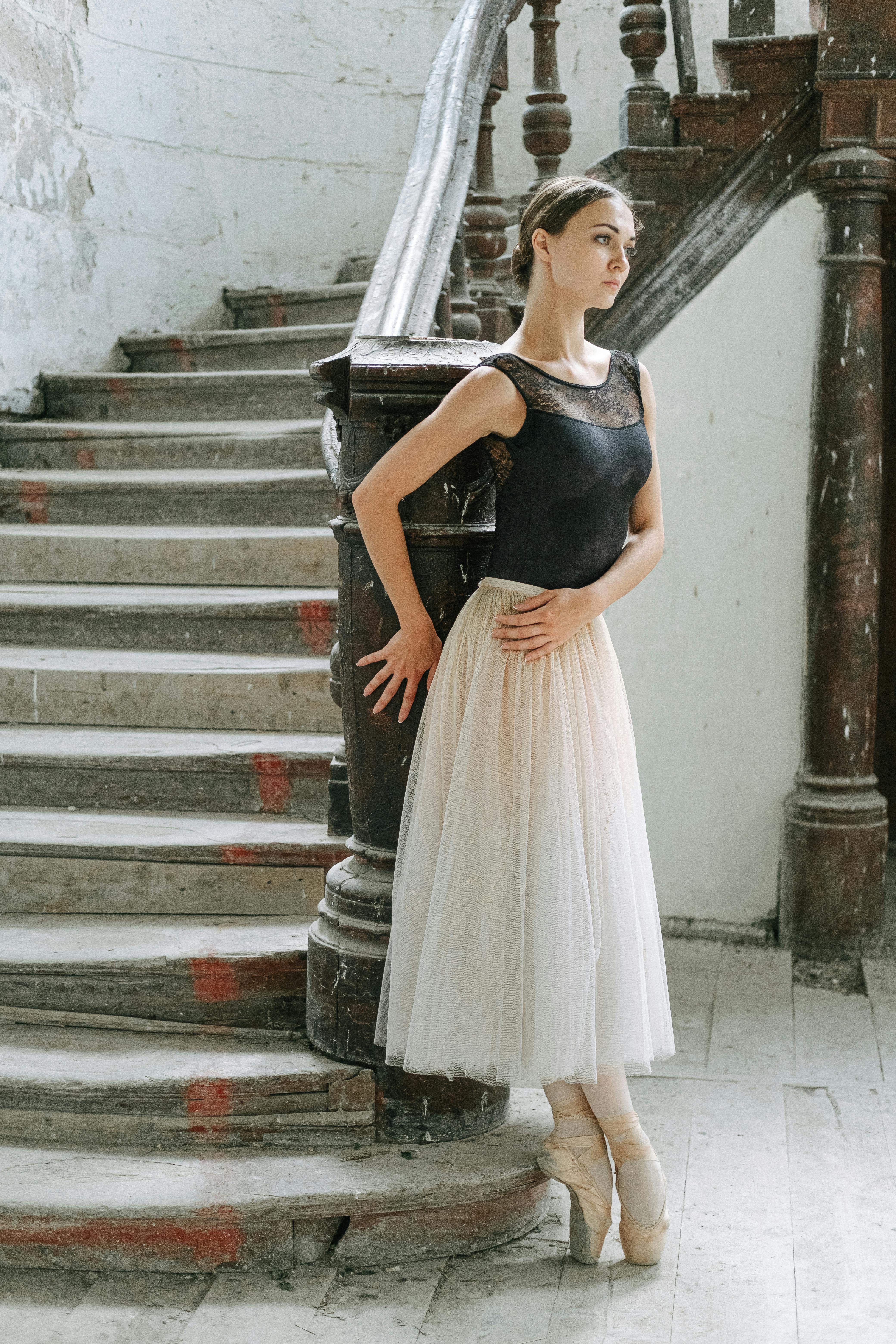 Woman Leaning on a Railing · Free Stock Photo