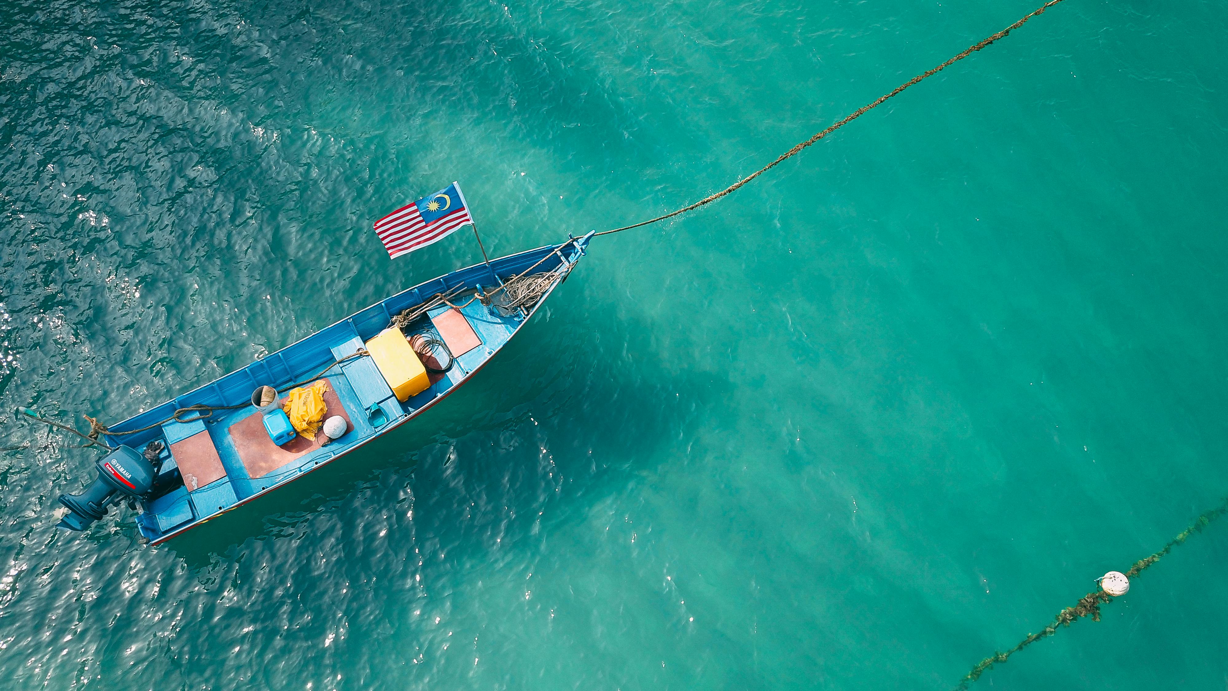 Motorboat floating on calm sea · Free Stock Photo