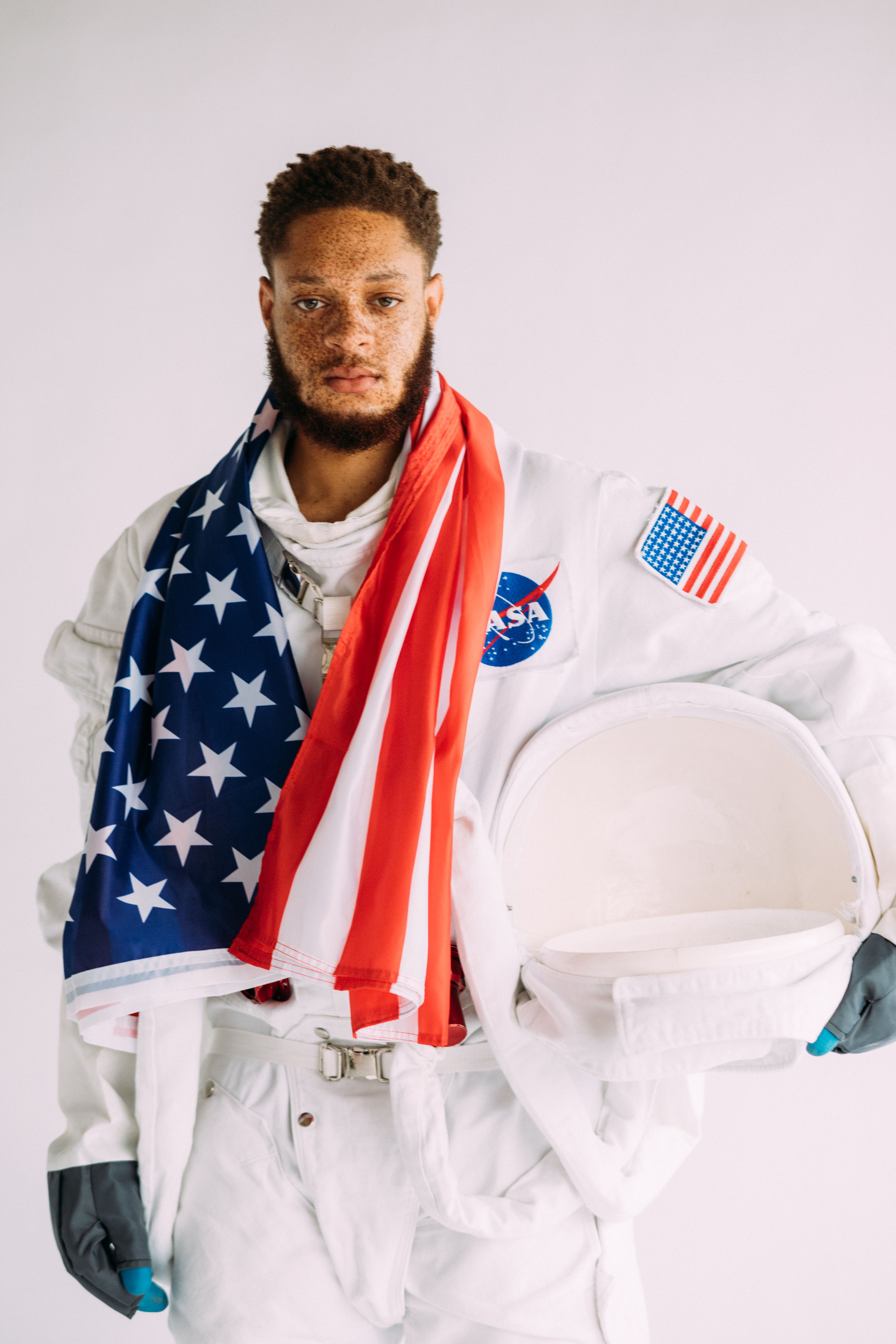 Man Wearing A Space Suit · Free Stock Photo