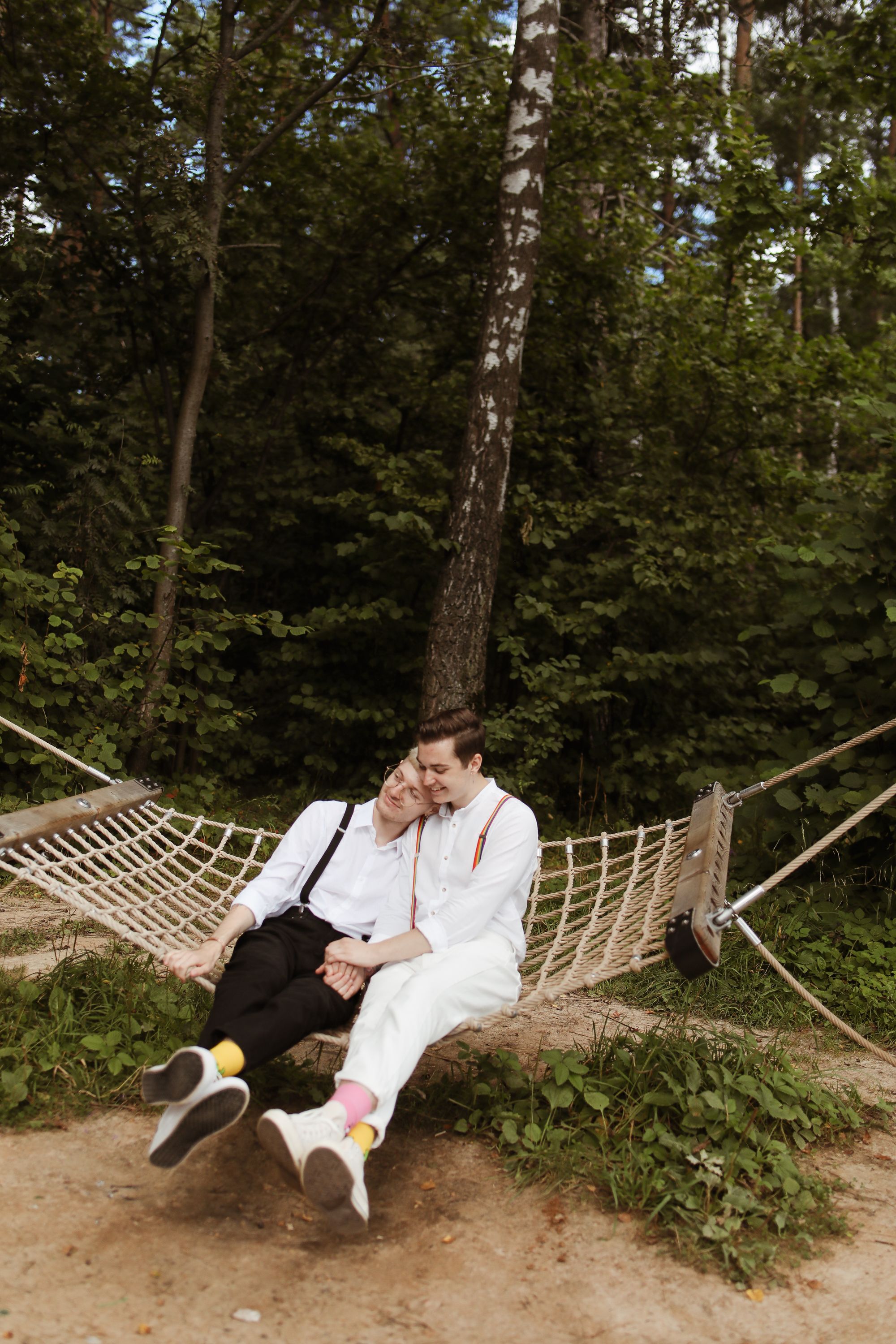 A Romantic Couple Sitting on a Hammock · Free Stock Photo