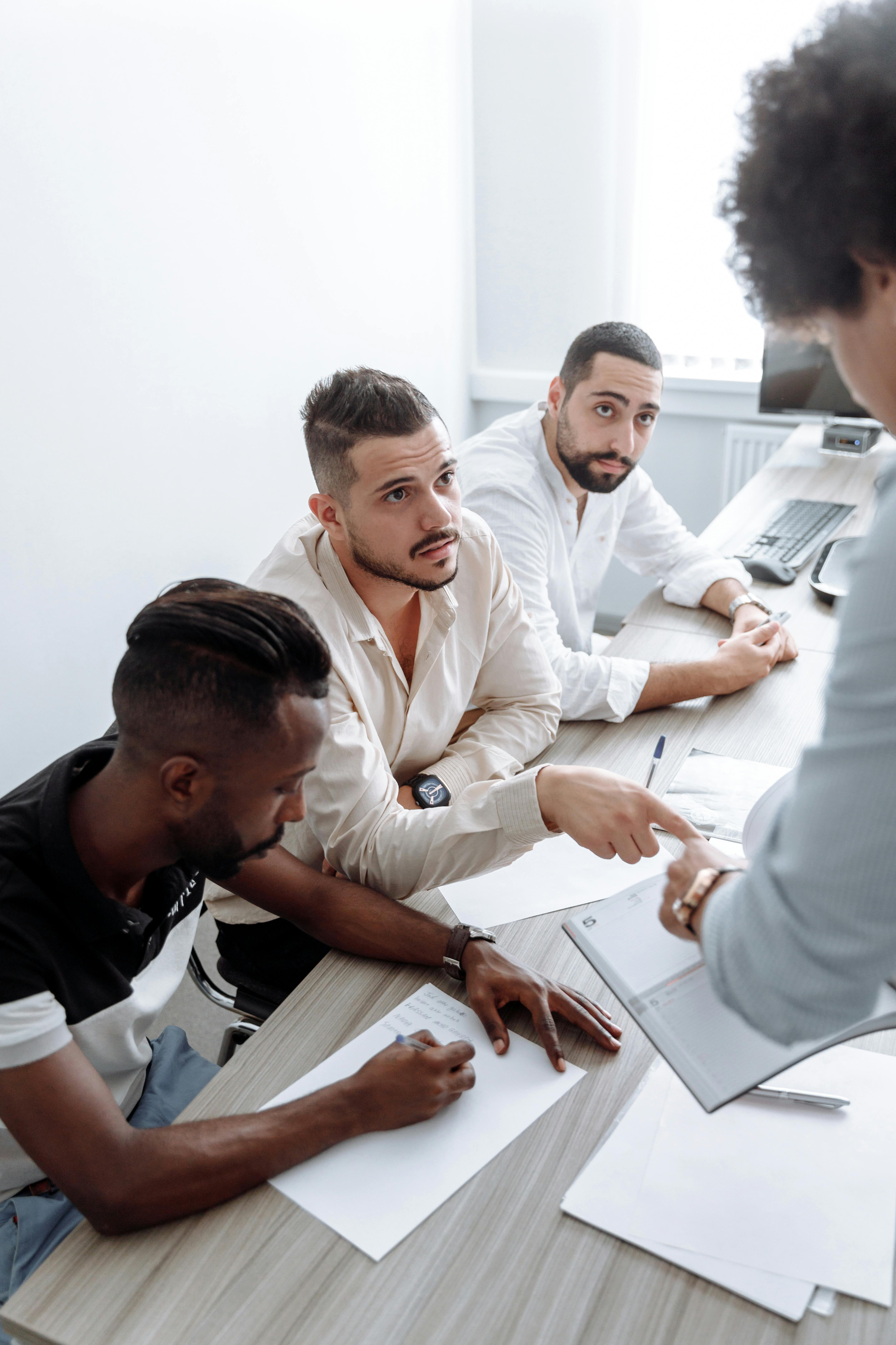 Group of People Having a Discussion · Free Stock Photo