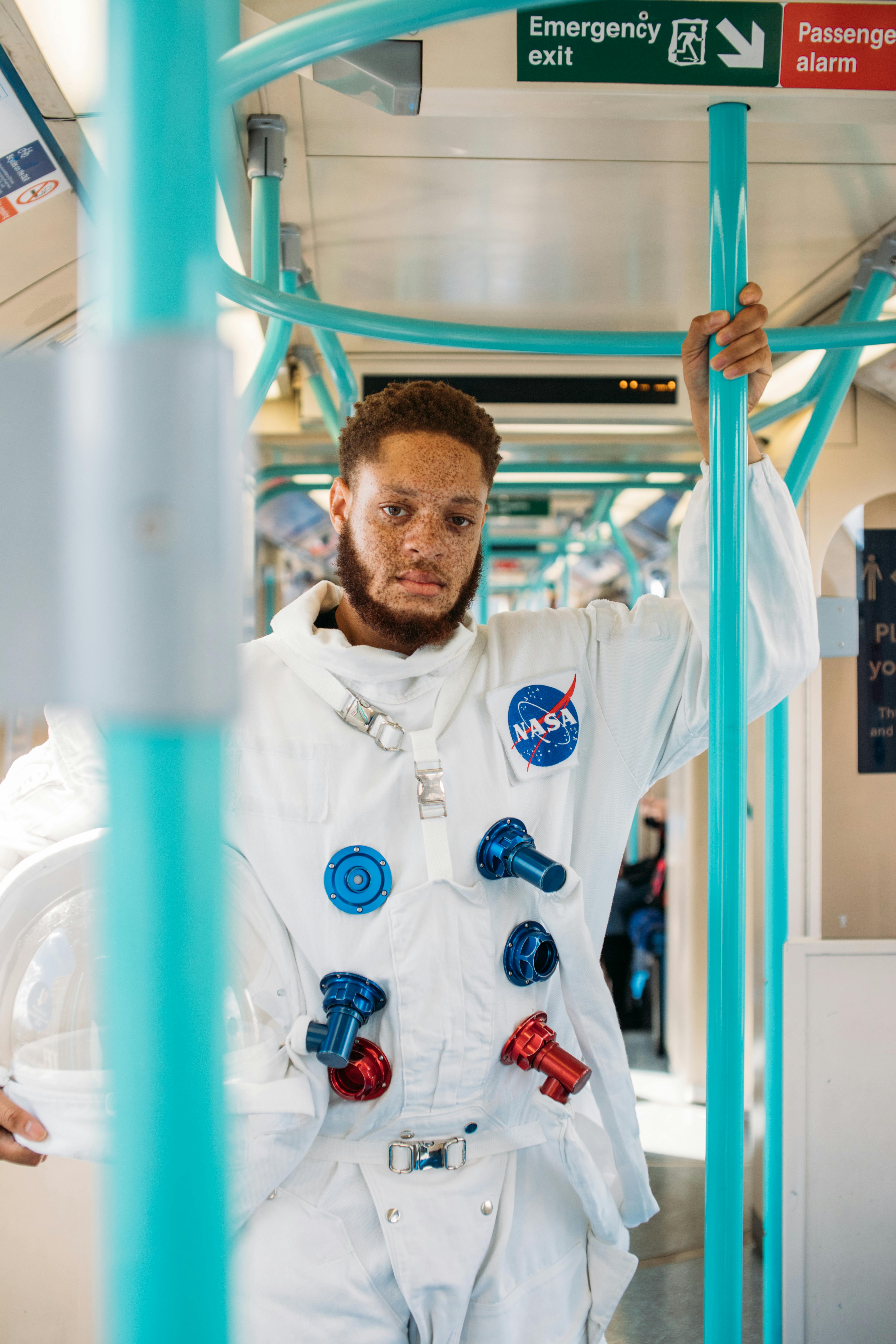Man In A Costume Inside A Train · Free Stock Photo