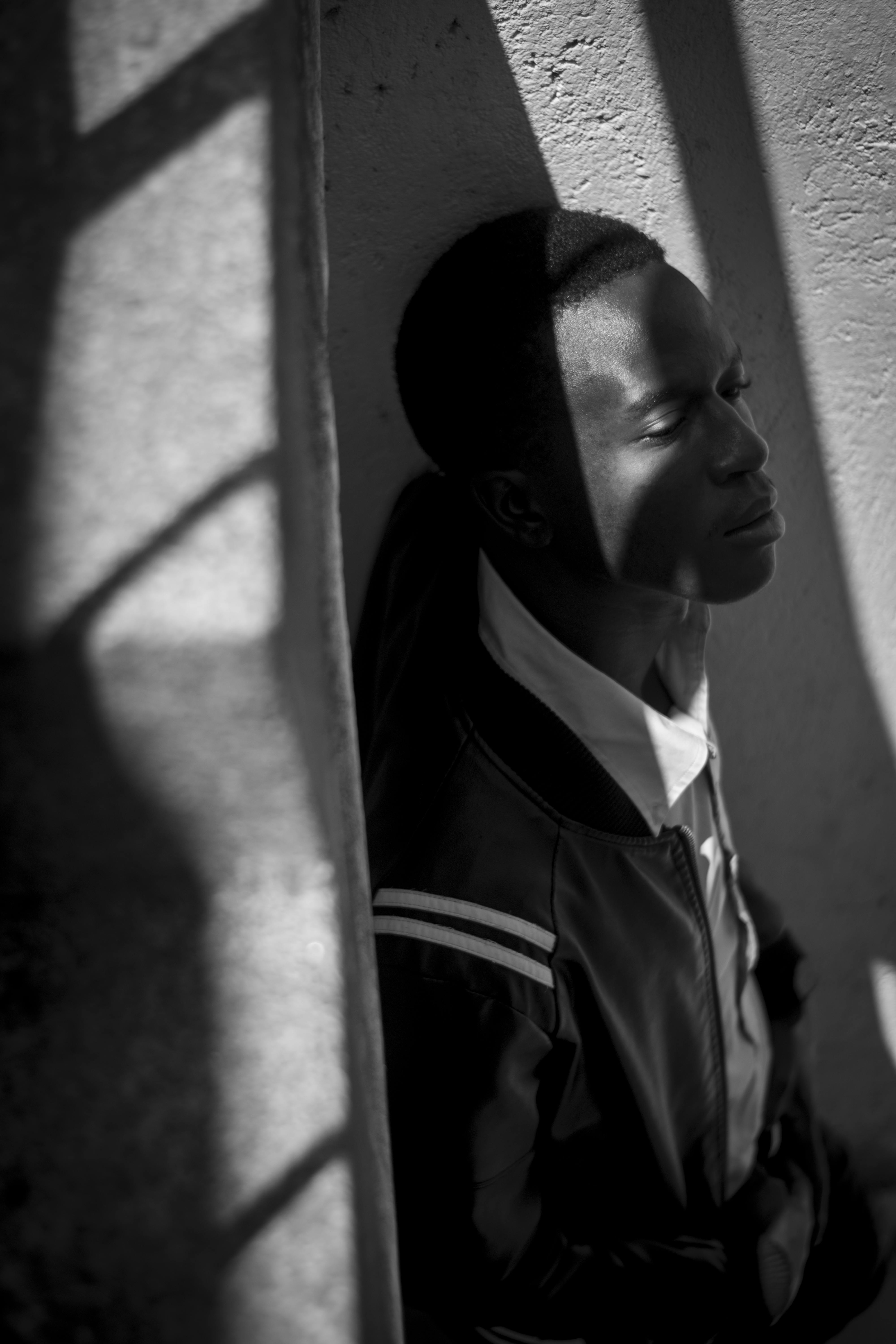 Man in Blue Collared Long Sleeves Looking Afar · Free Stock Photo