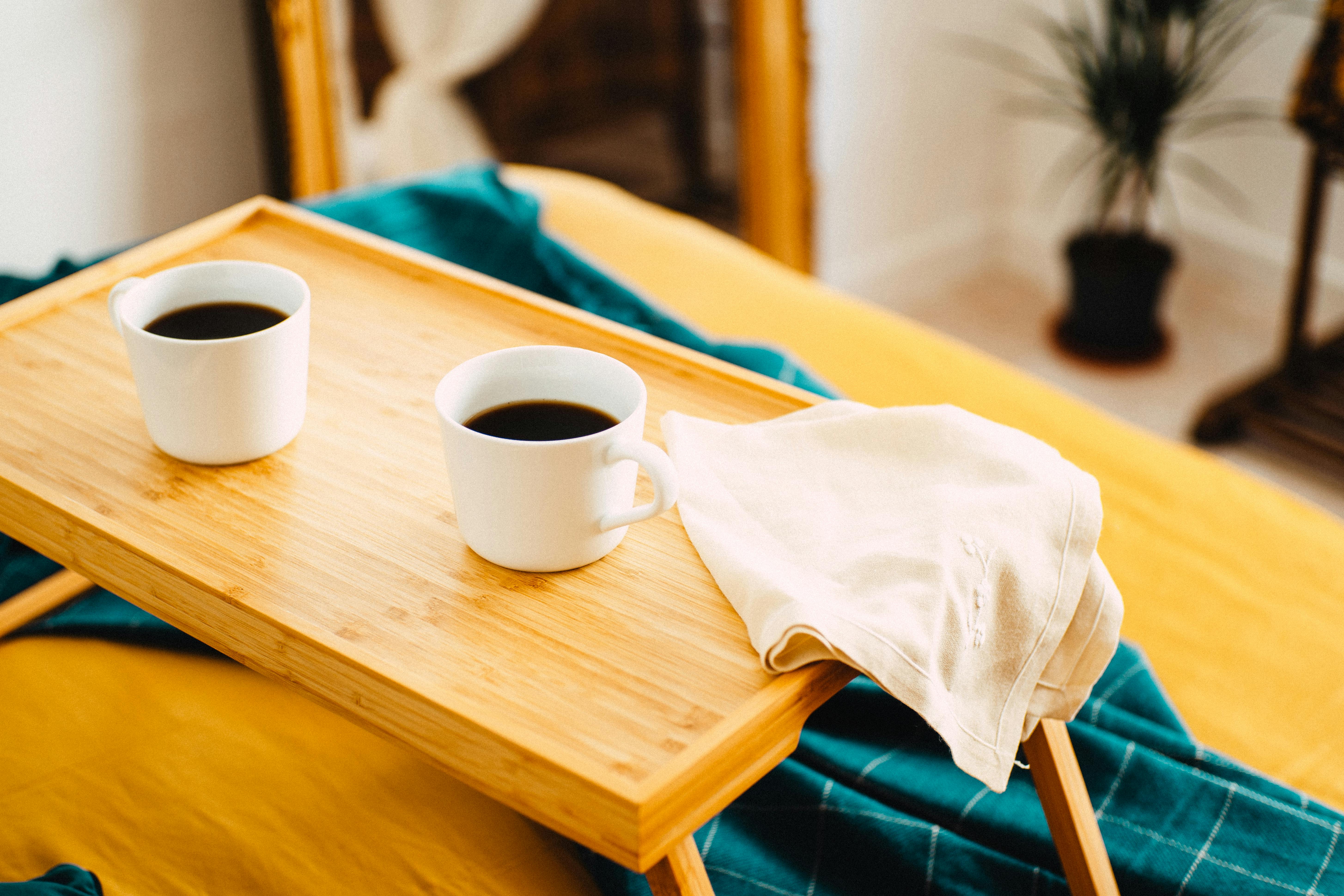 Cup of hot aromatic coffee on table in cafe · Free Stock Photo