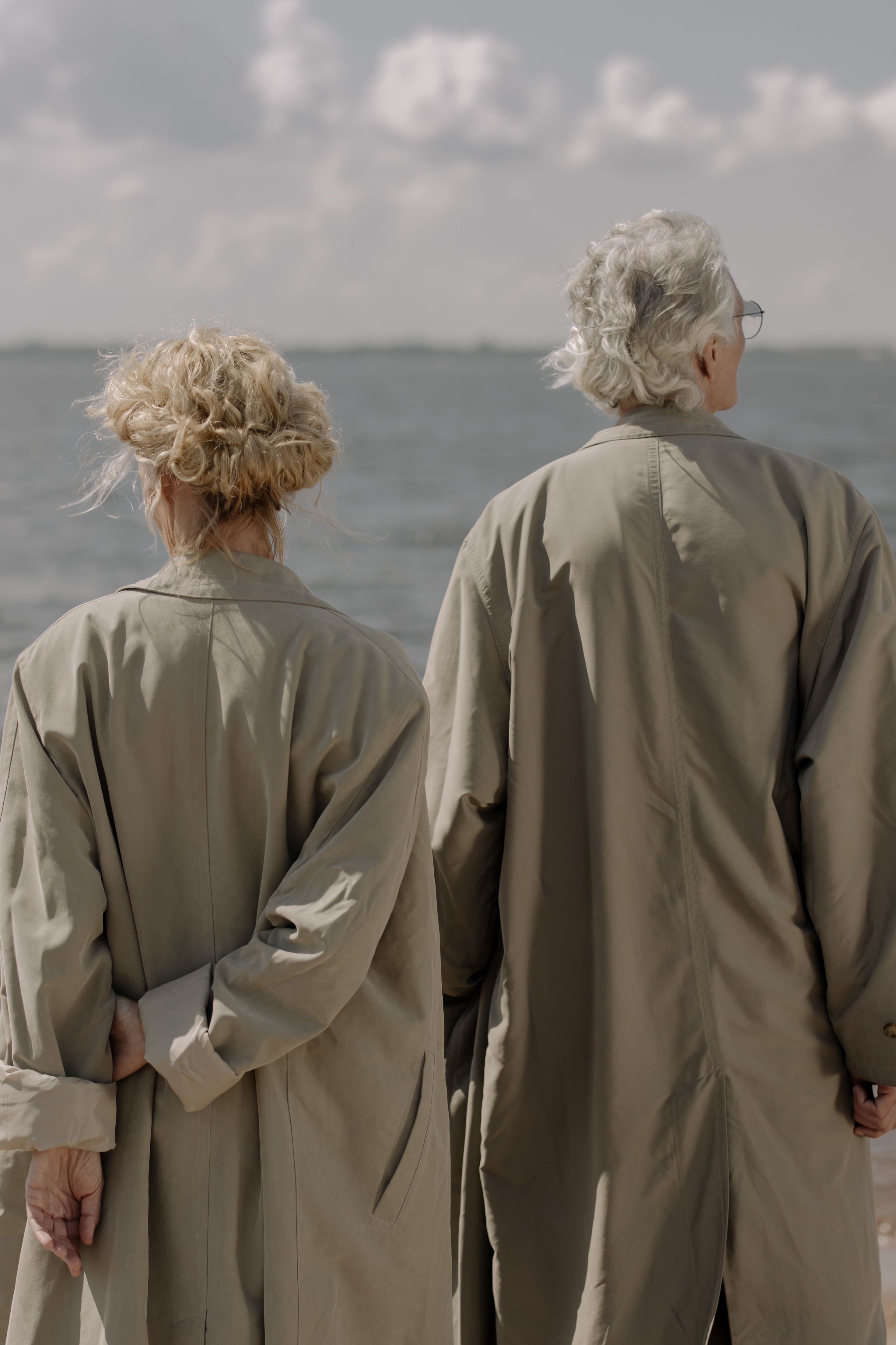 Back View of Person Wearing Brown Trench Coat · Free Stock Photo