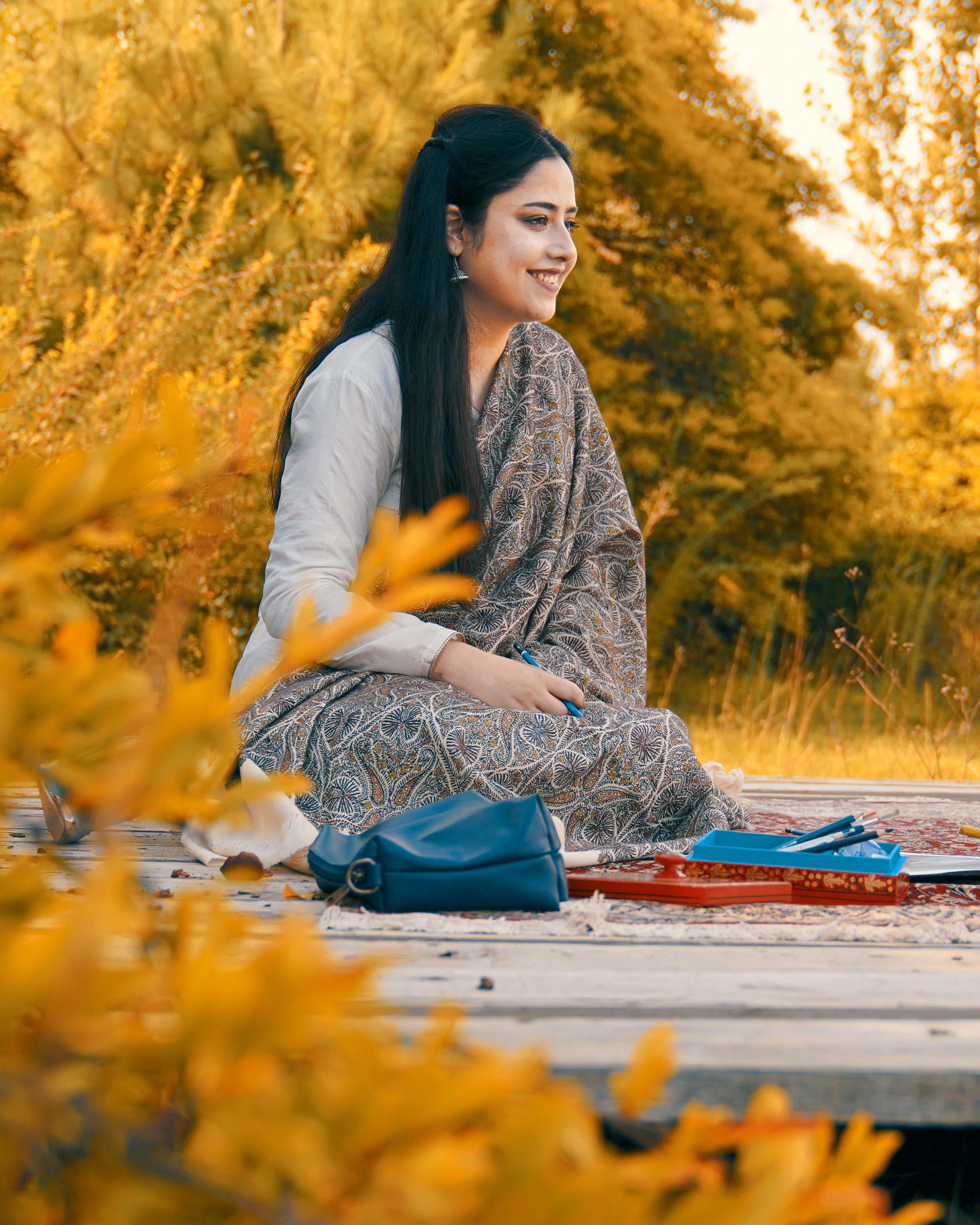 Sitting Woman in Red Saree Dress · Free Stock Photo