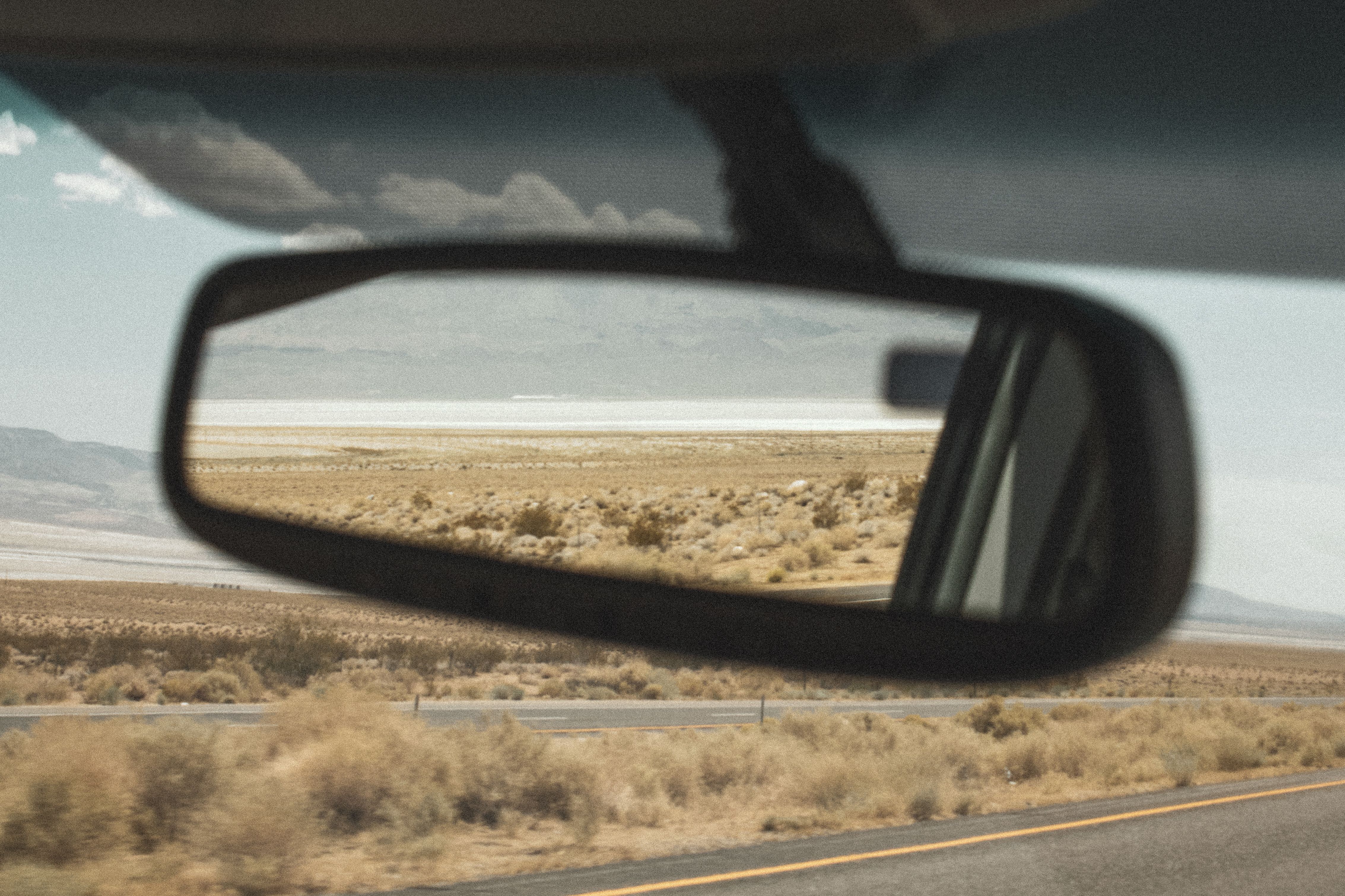 Close-Up Shot of a Rear View Mirror of a Car · Free Stock Photo