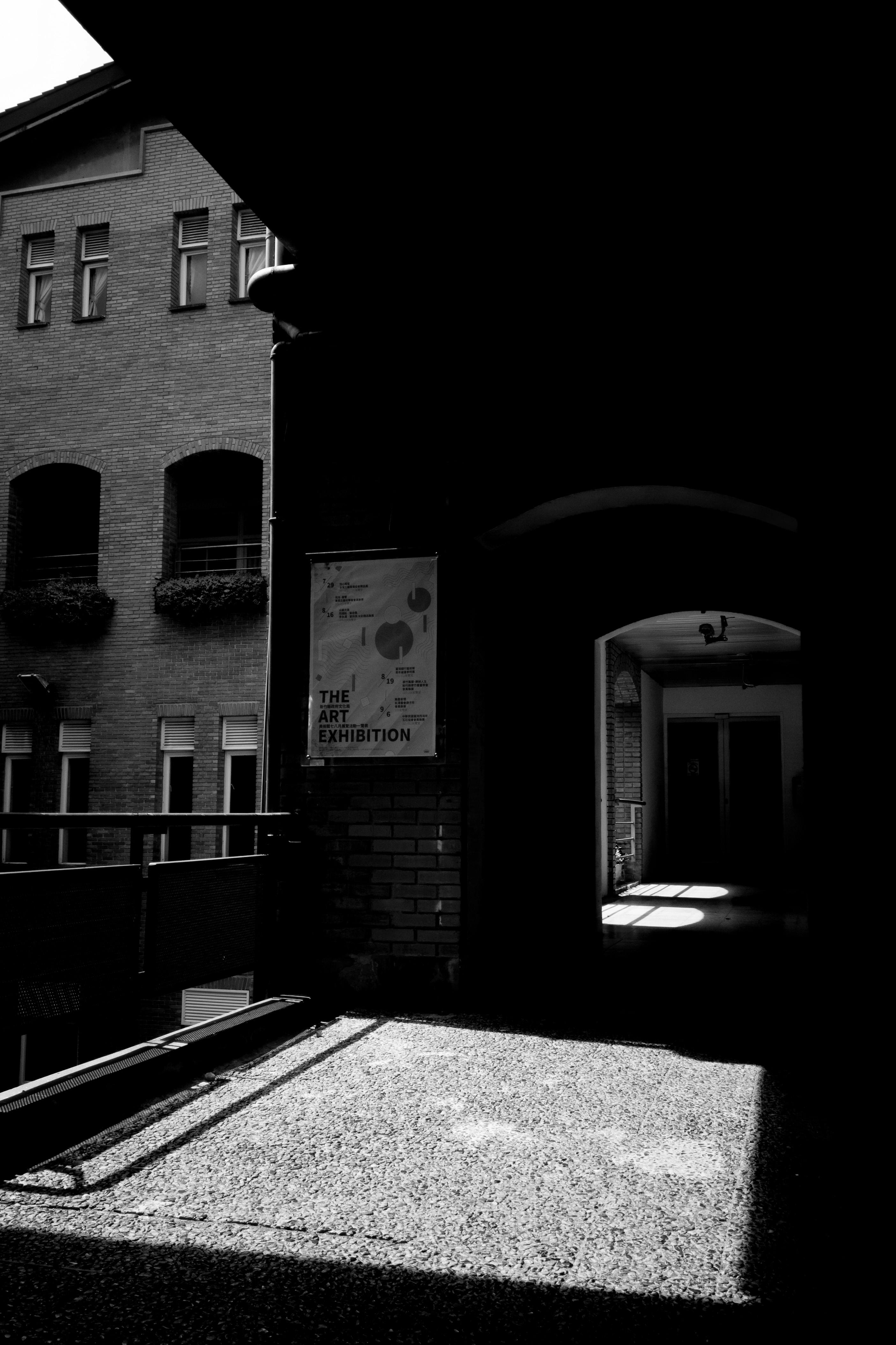 Grayscale Photo of Concrete Wall · Free Stock Photo