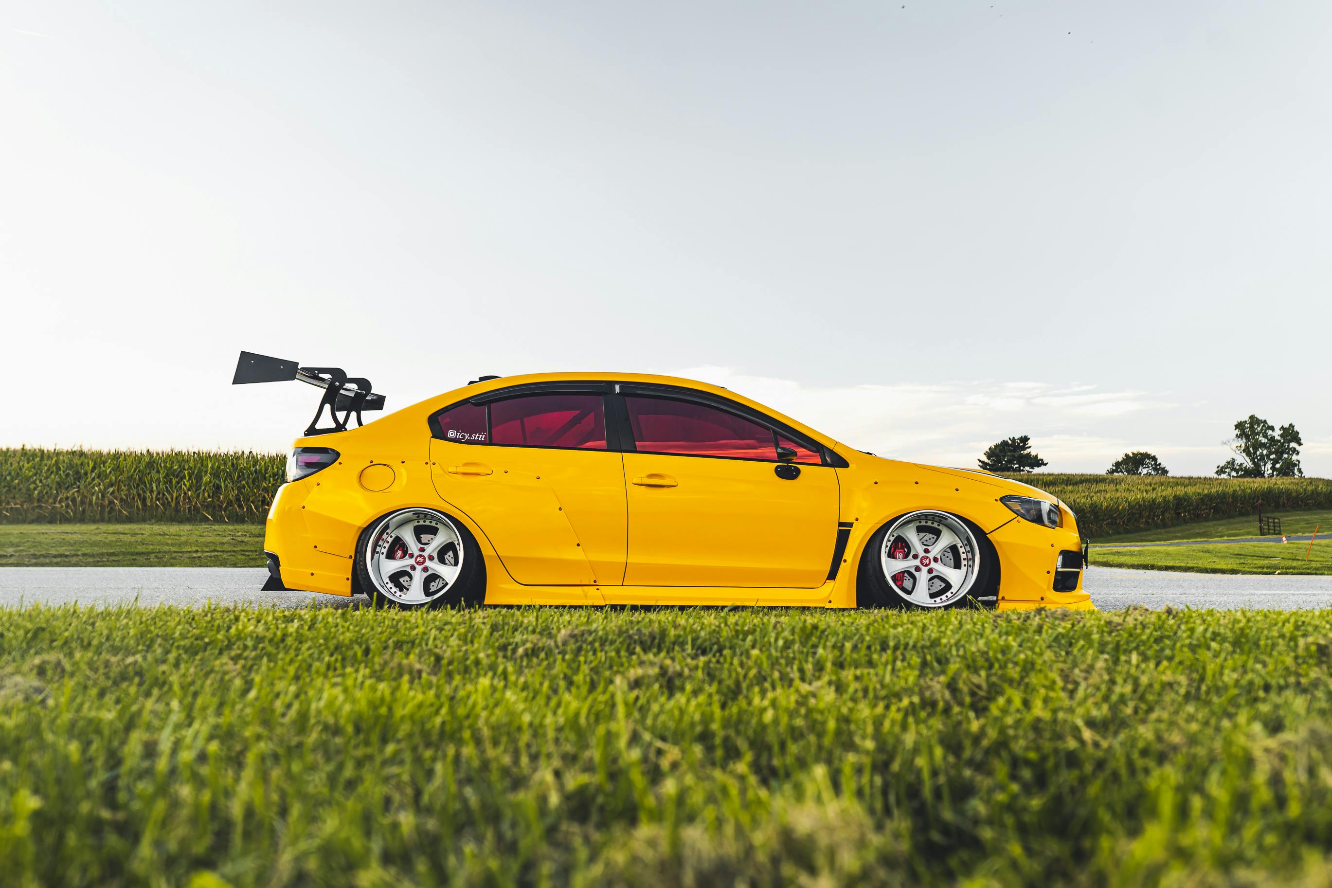 Yellow Vehicle Parked on Side of the Road · Free Stock Photo