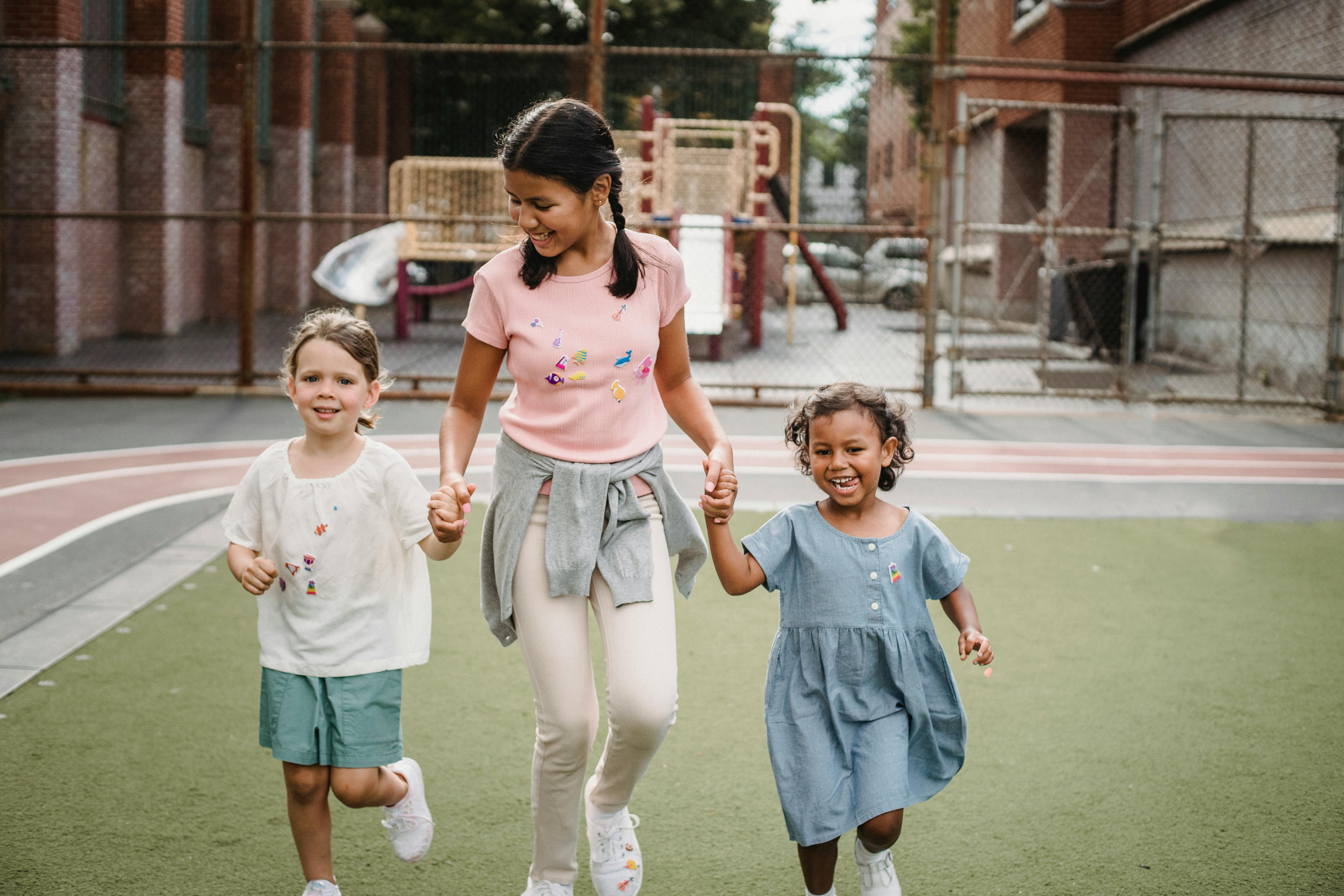 Girls Playing on the Playground · Free Stock Photo