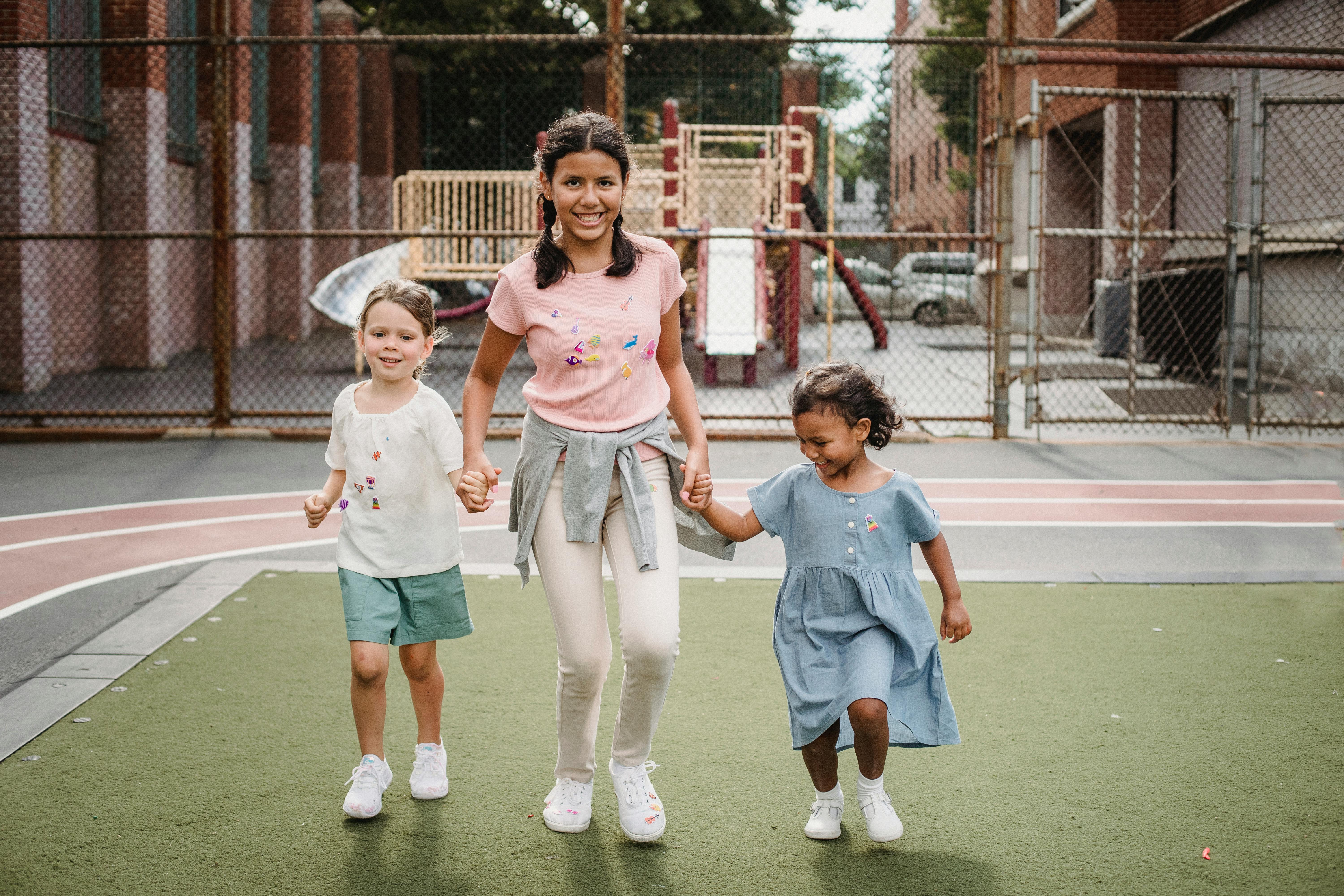 Girls Playing in the Playground · Free Stock Photo