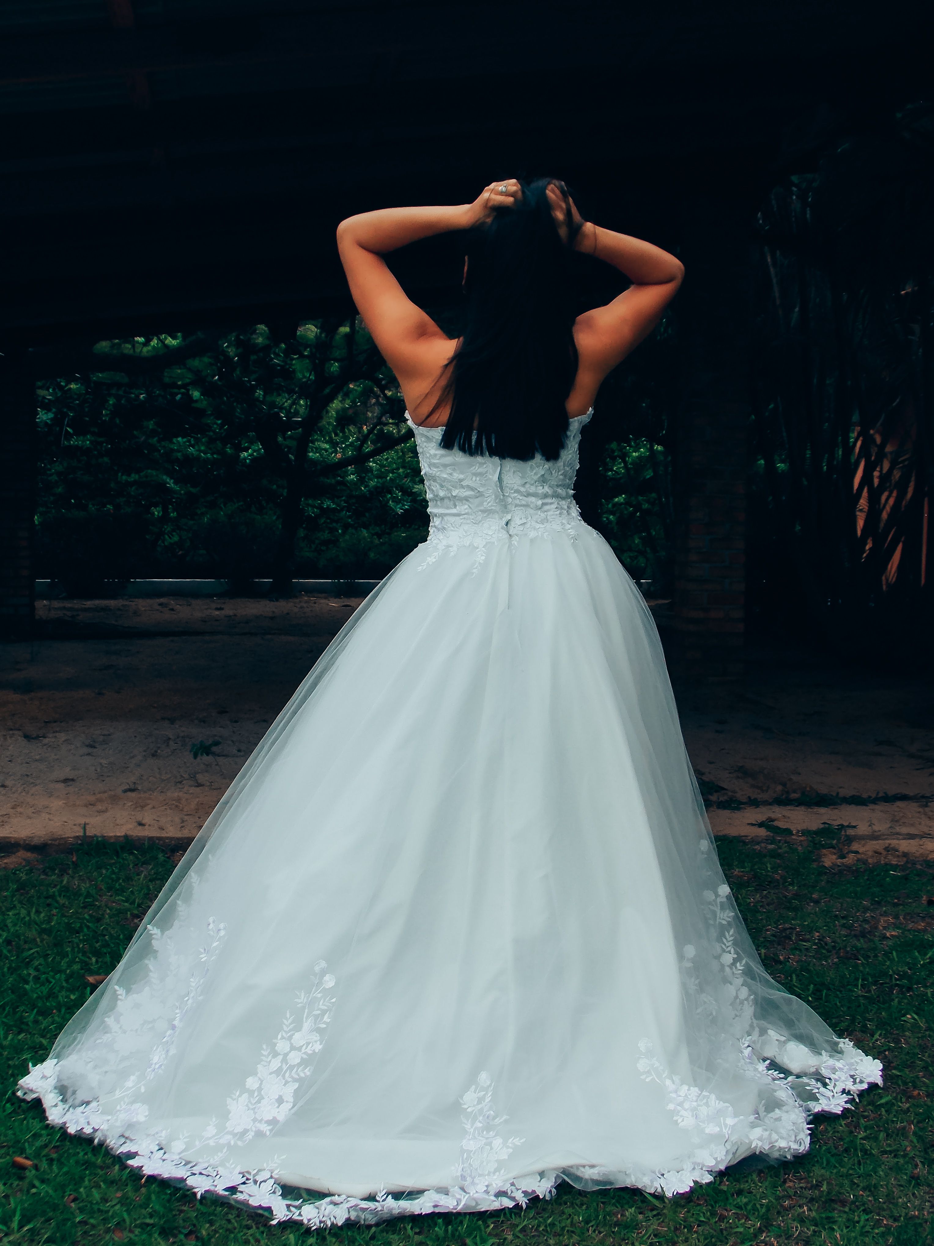 A Woman Wearing a White Dress · Free Stock Photo