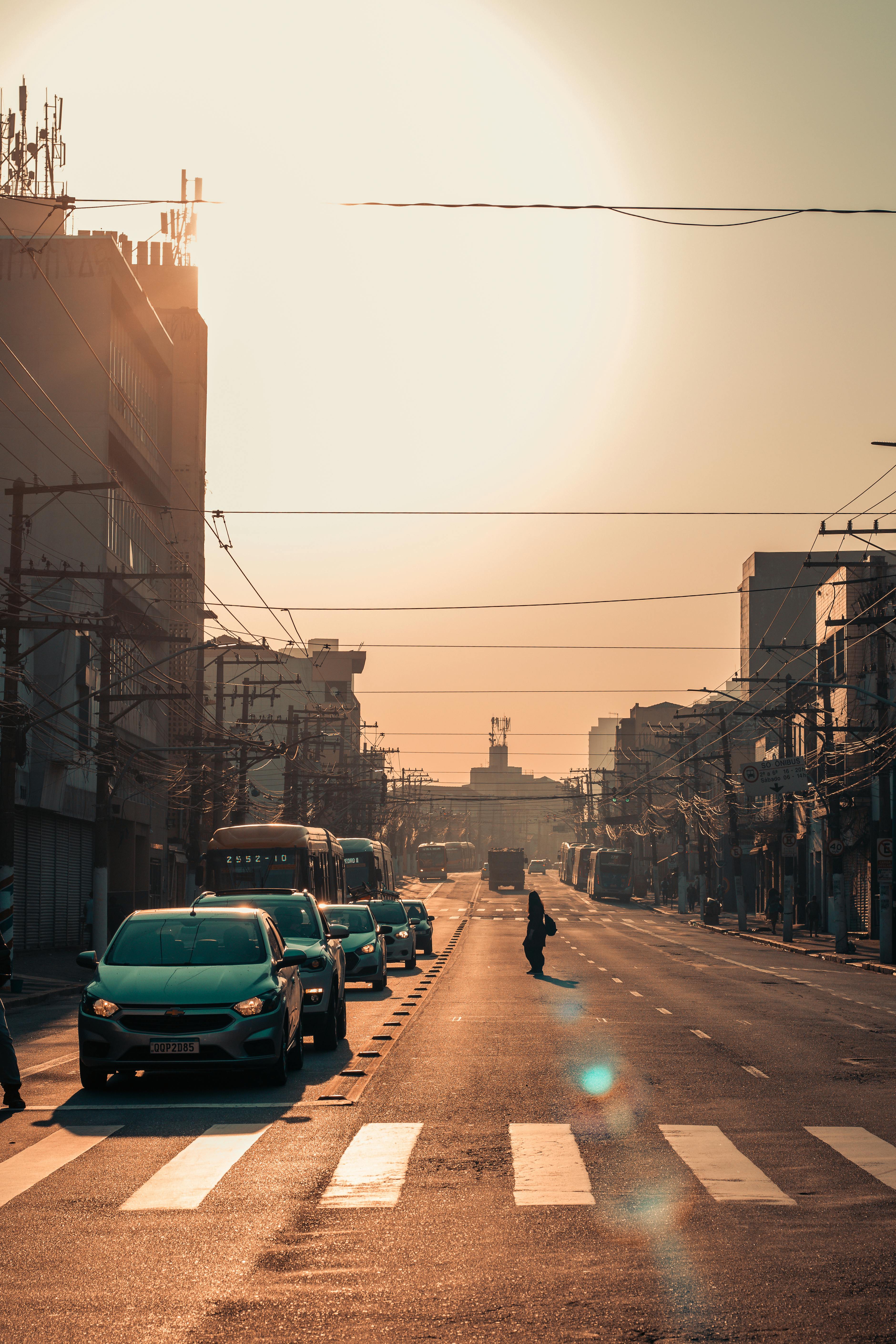 City street with cars and urban transport · Free Stock Photo