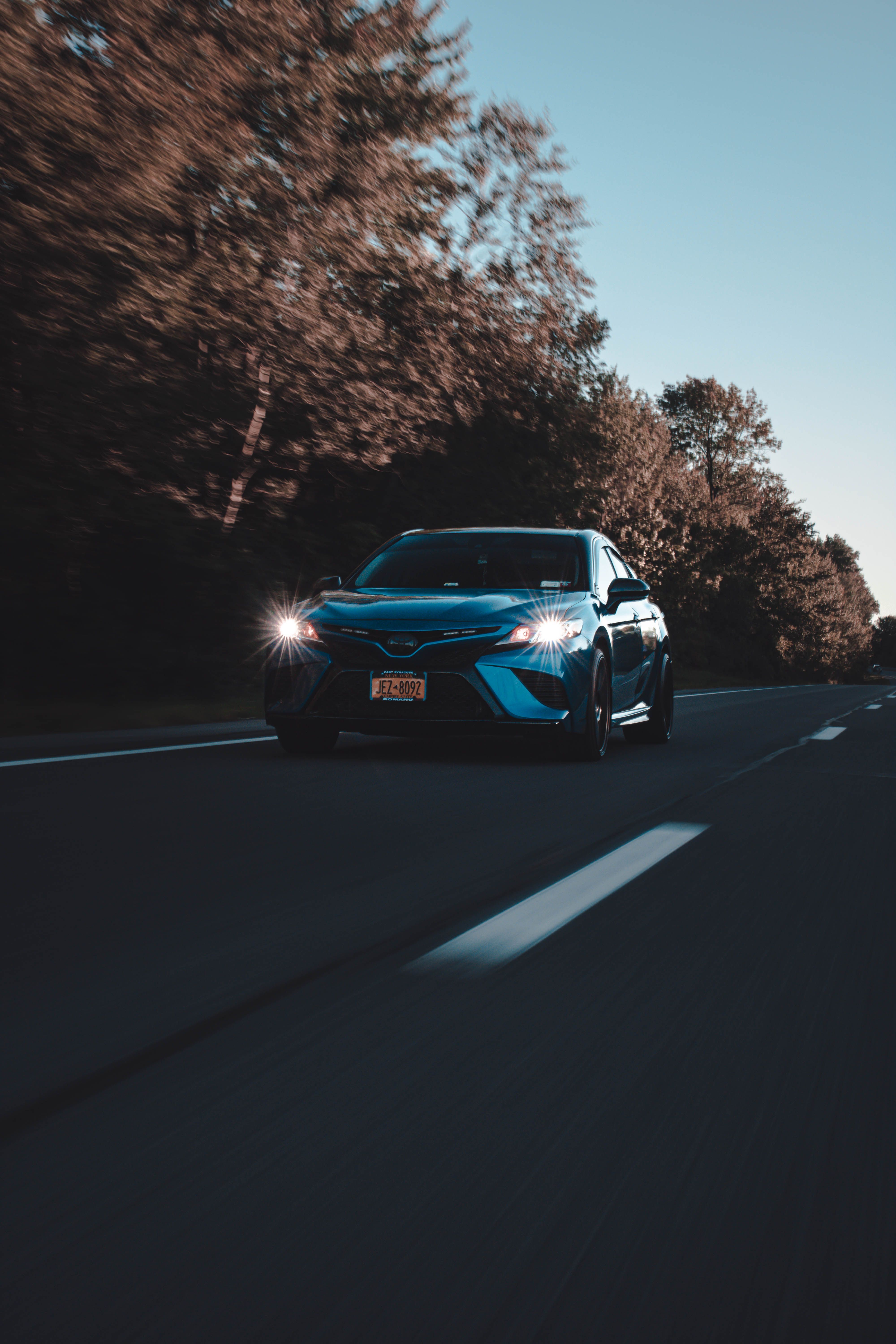 A Car Traveling on the Road · Free Stock Photo