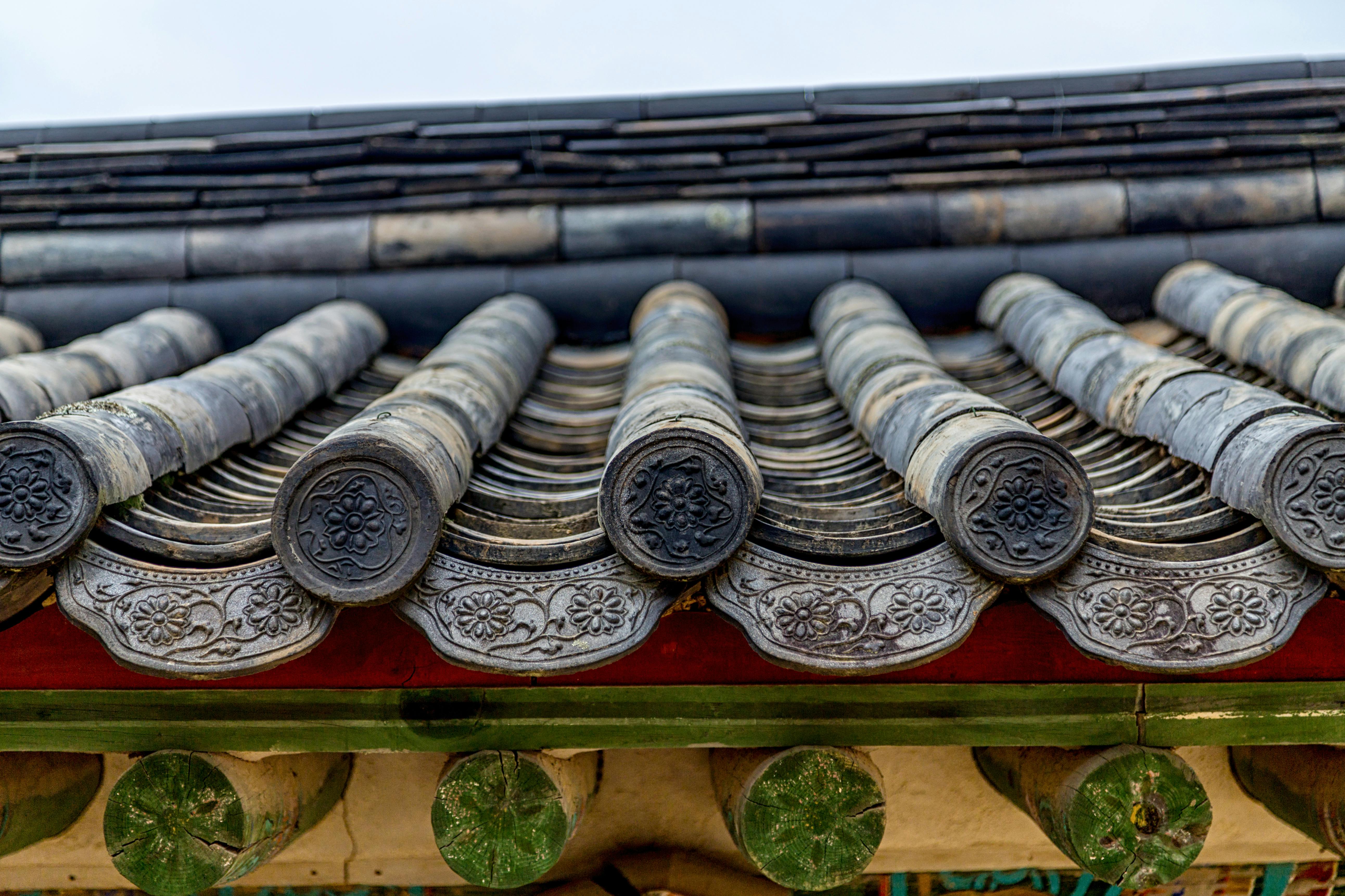 Louvers Window With Bas Relief on a White Concrete Building With Roof ...
