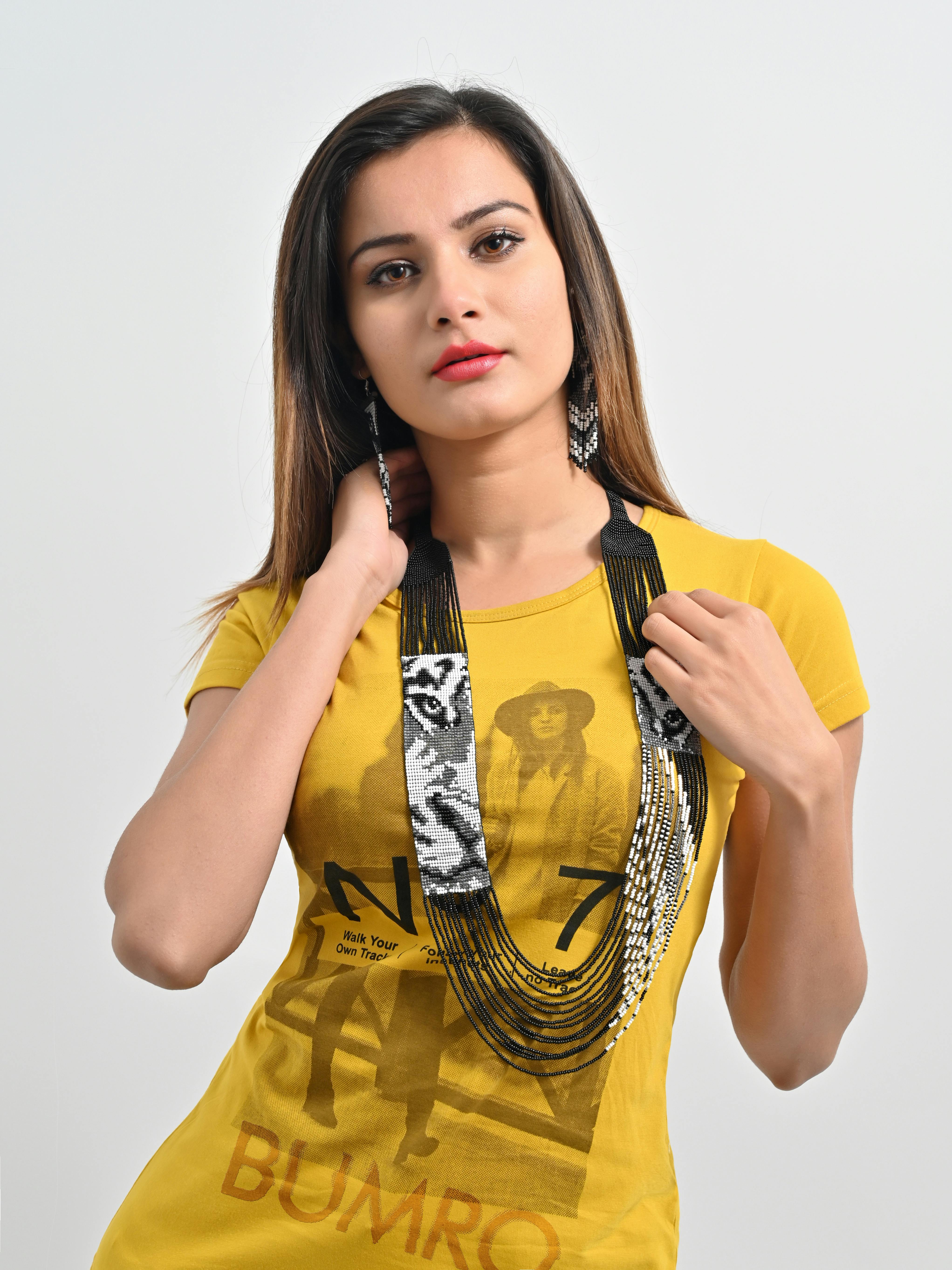 A Beautiful Model Wearing a Necklace · Free Stock Photo