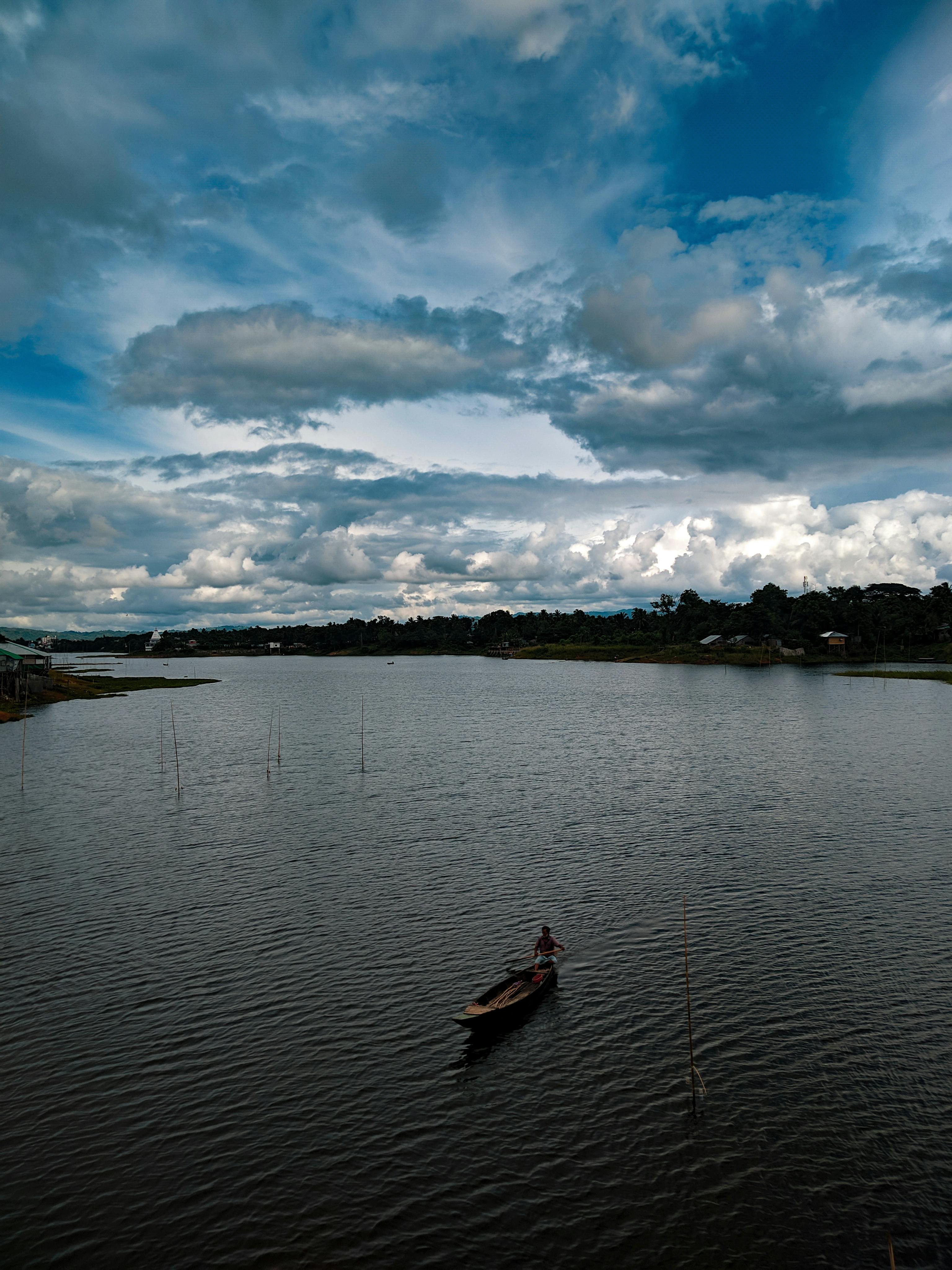 Men Riding a Boat · Free Stock Photo