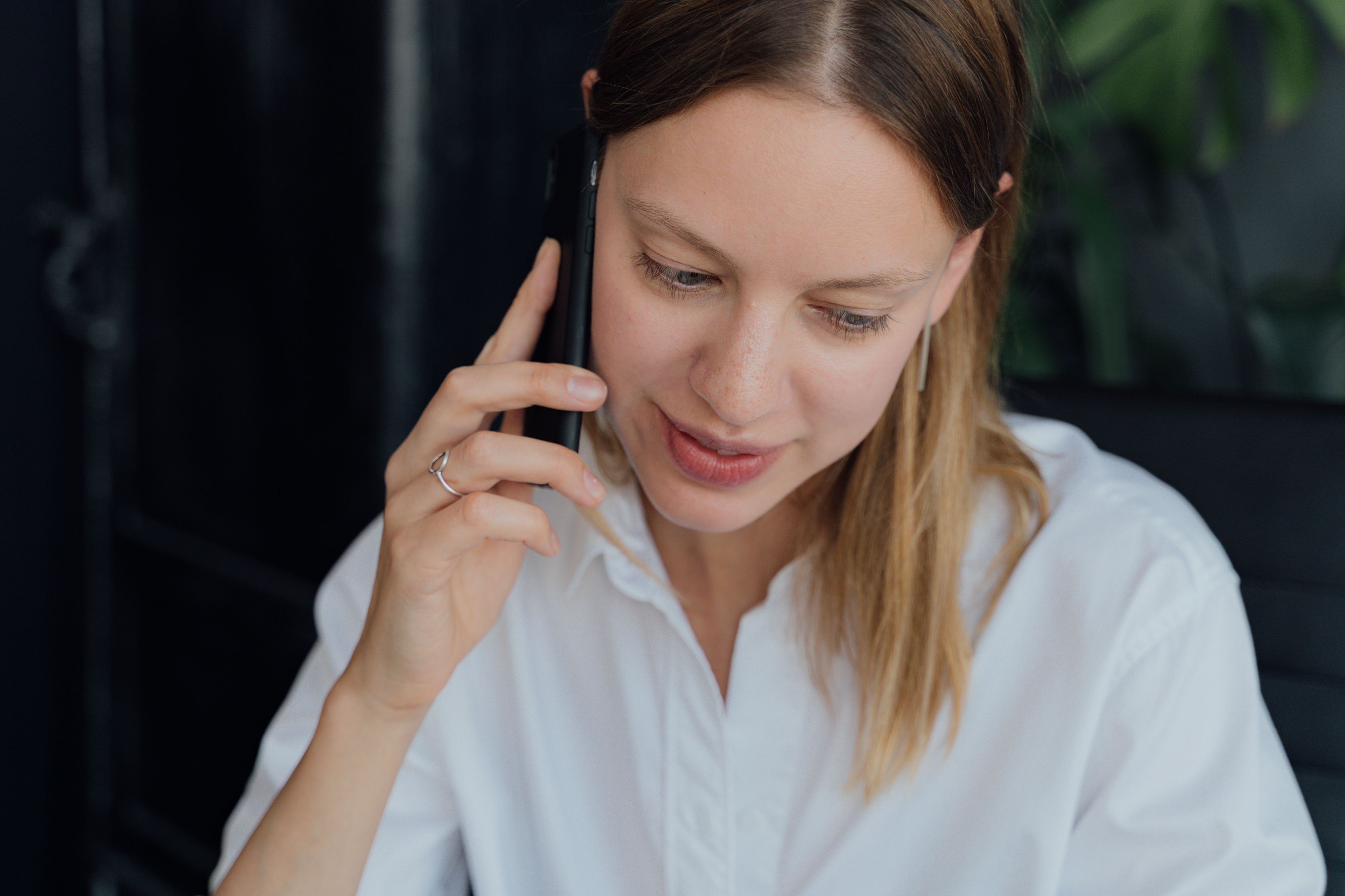 Woman Calling using a Smartphone · Free Stock Photo