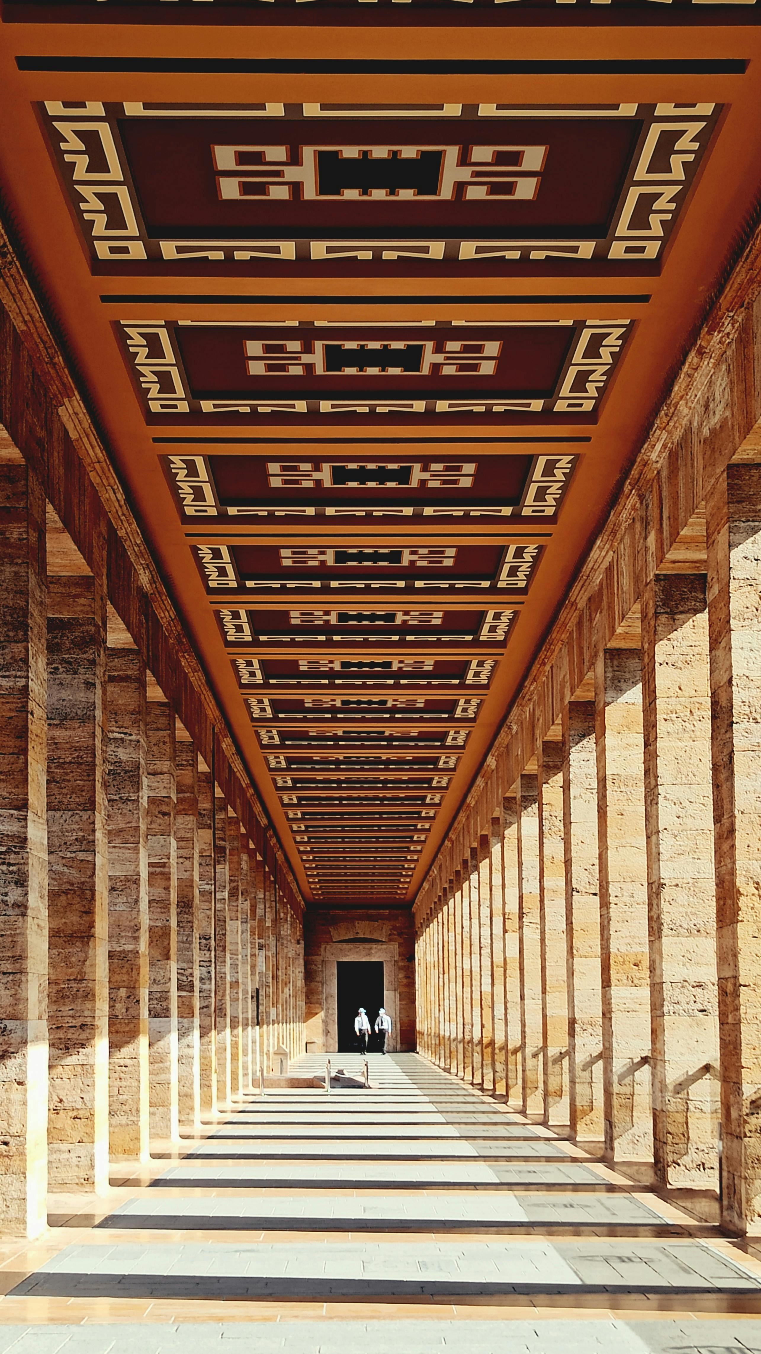 Person Walking on Hallway at the Building · Free Stock Photo