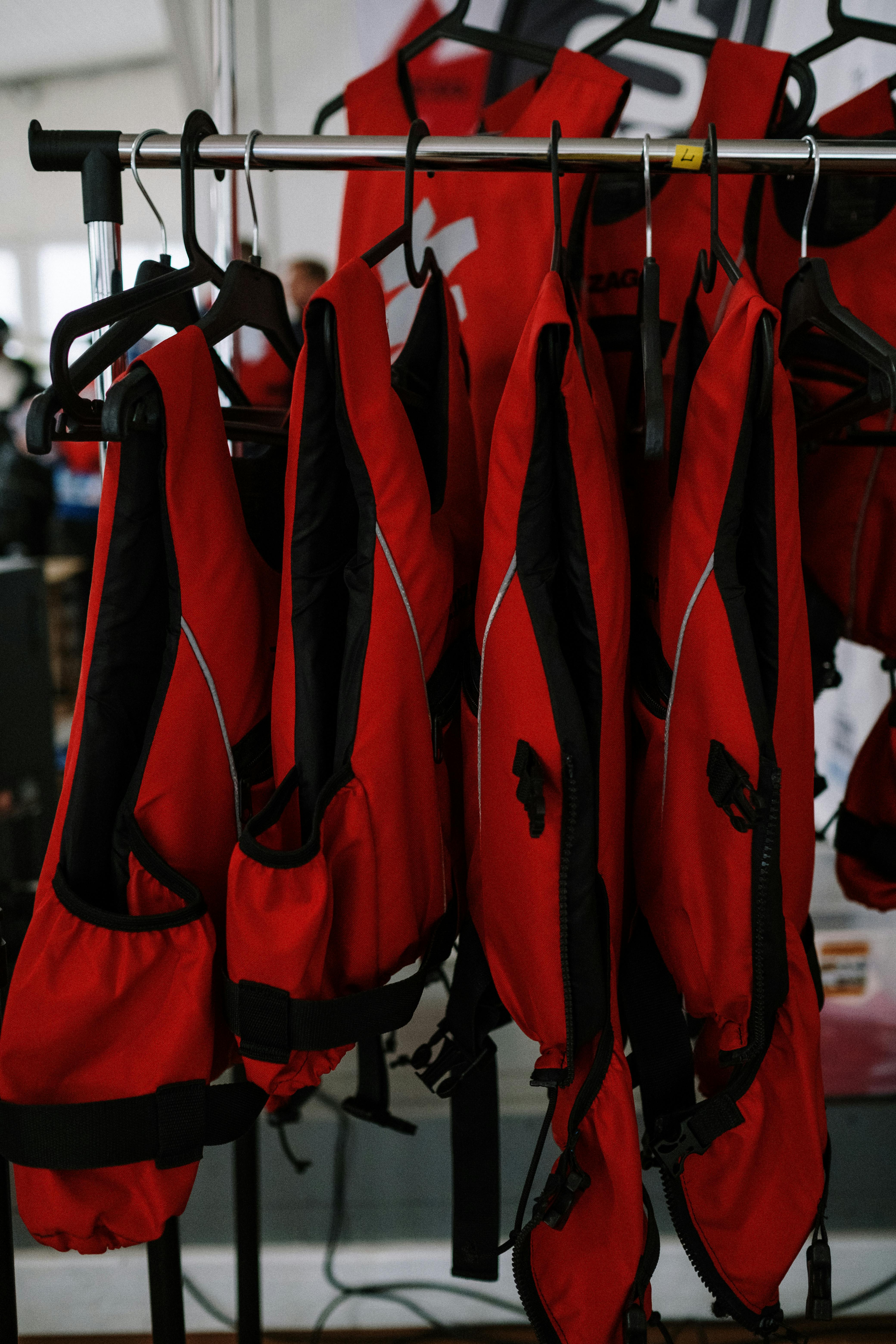 Life Vests Hanging on a Clothesline · Free Stock Photo