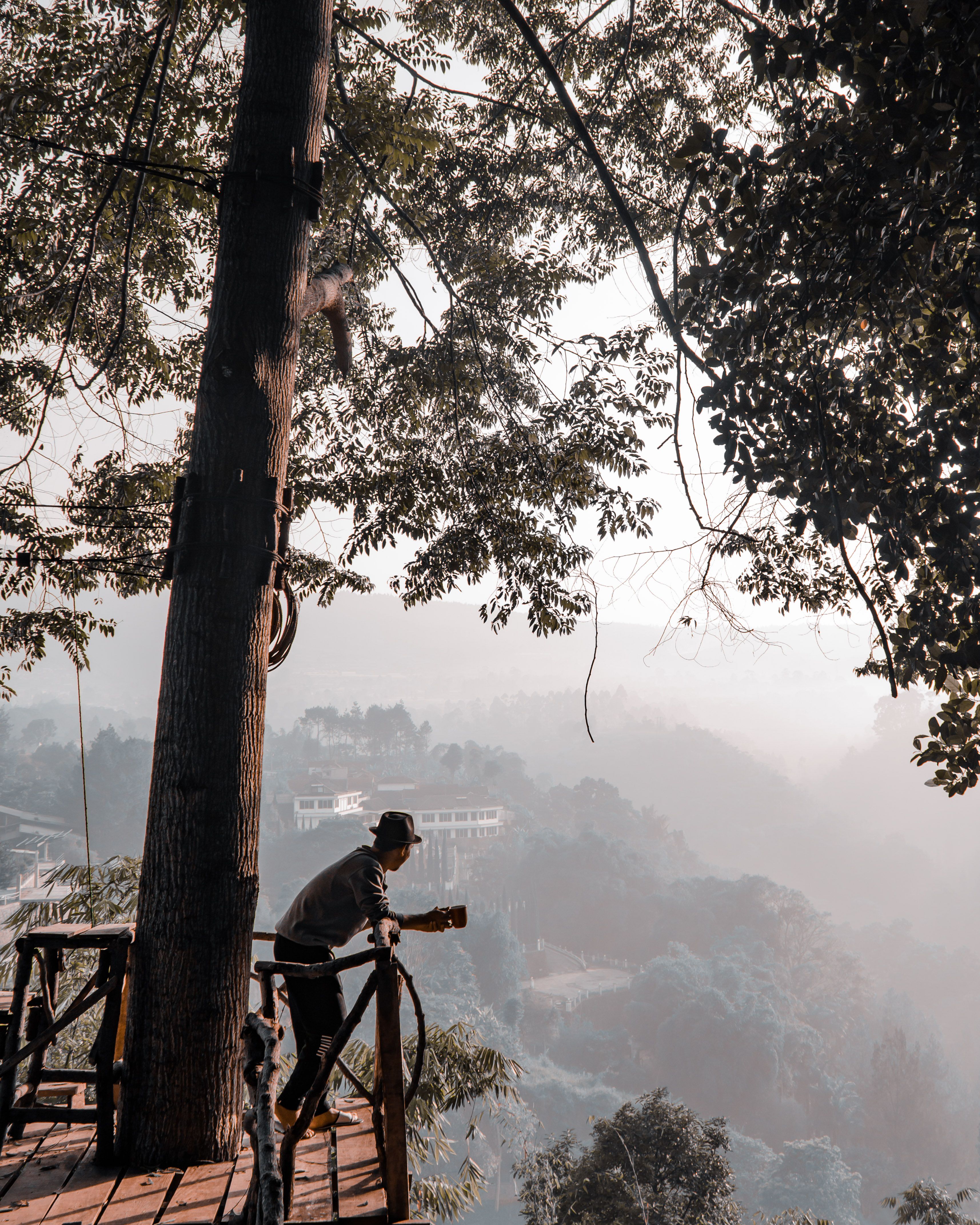 A Man Standing on a Dock while Looking at the Beautiful Scenery · Free ...