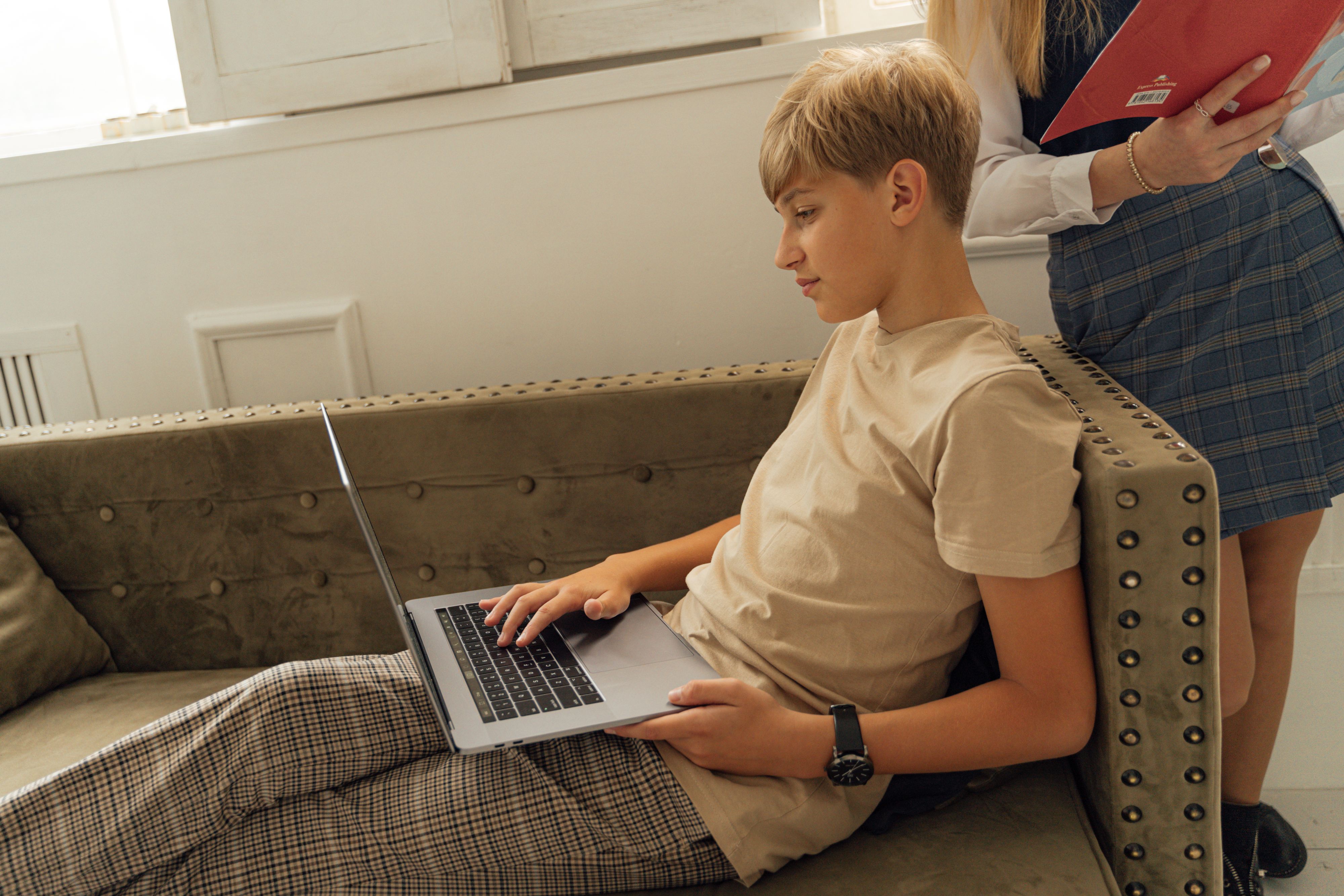 A Boy using a Laptop · Free Stock Photo