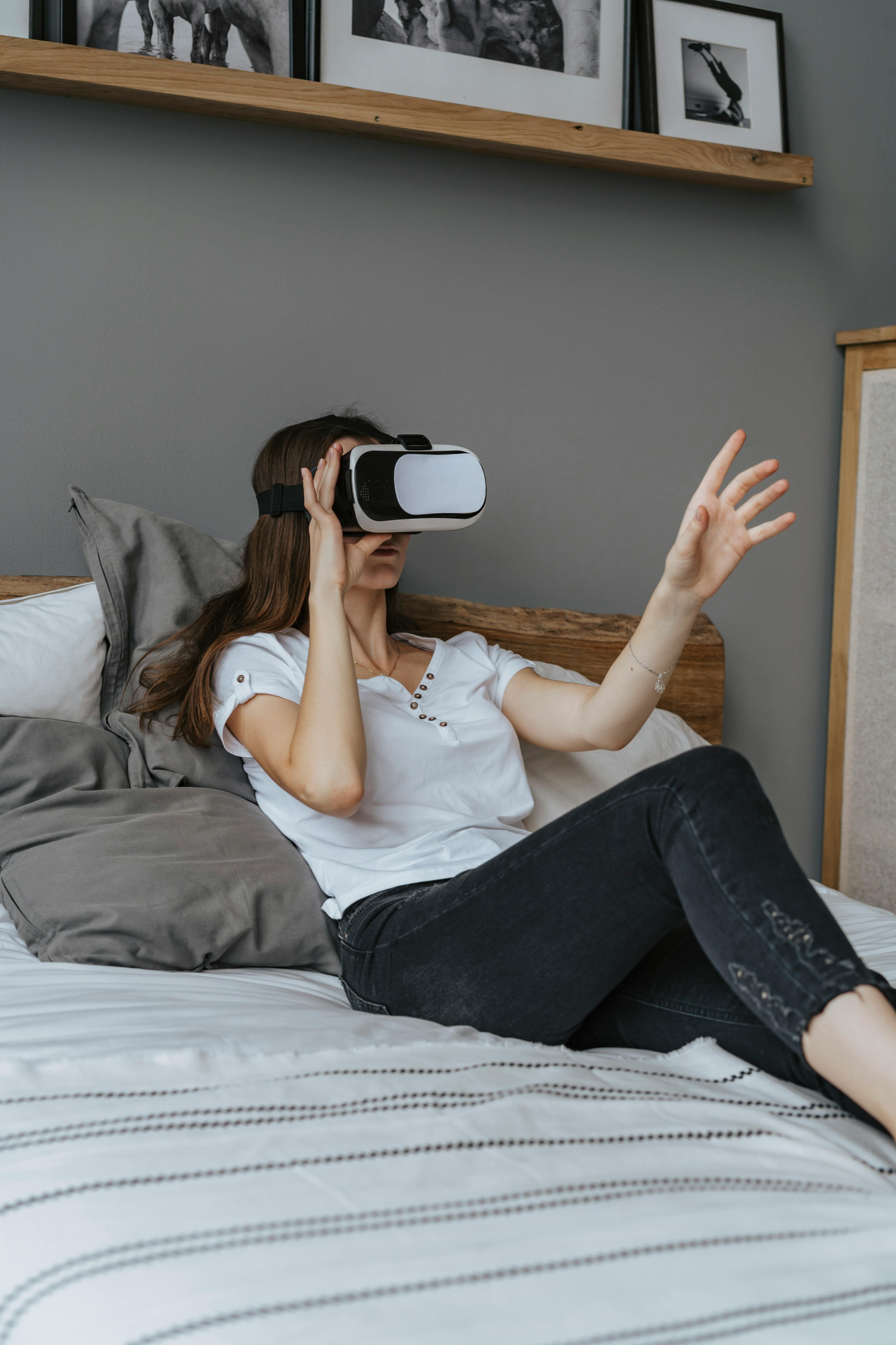 Woman Sitting on the Bed Wearing a Virtual Reality Googles · Free Stock ...