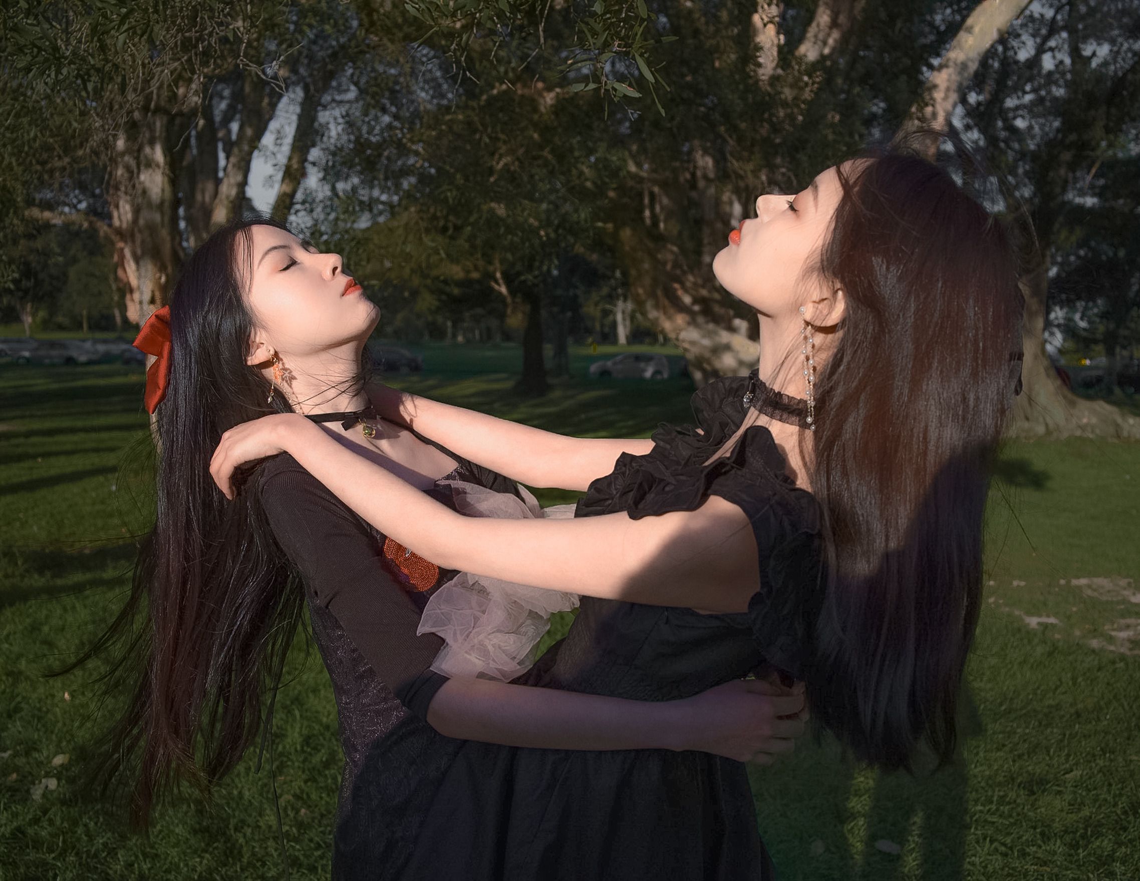 Women Holding Each Other while Leaning Back · Free Stock Photo