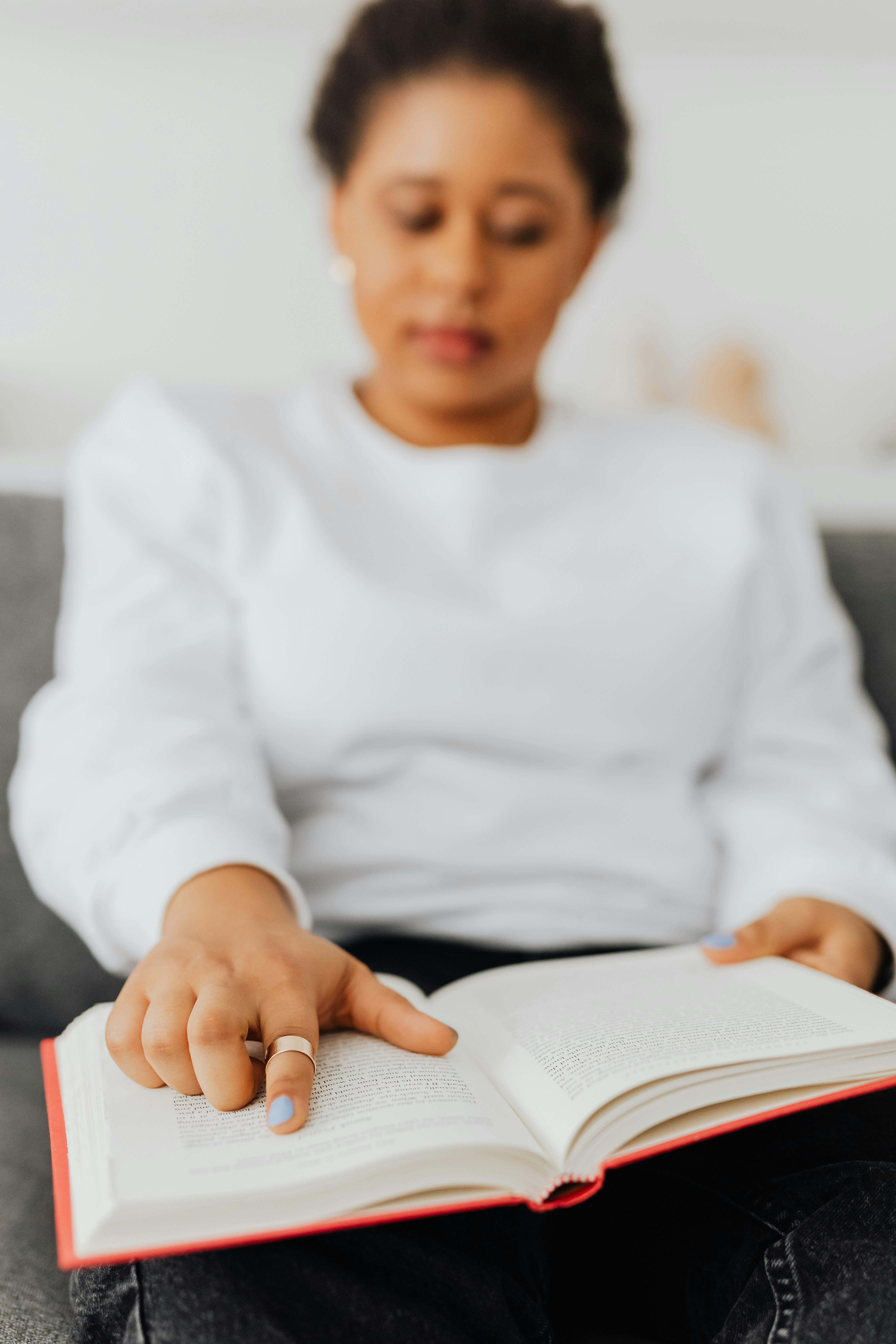 A Person Reading a Book · Free Stock Photo