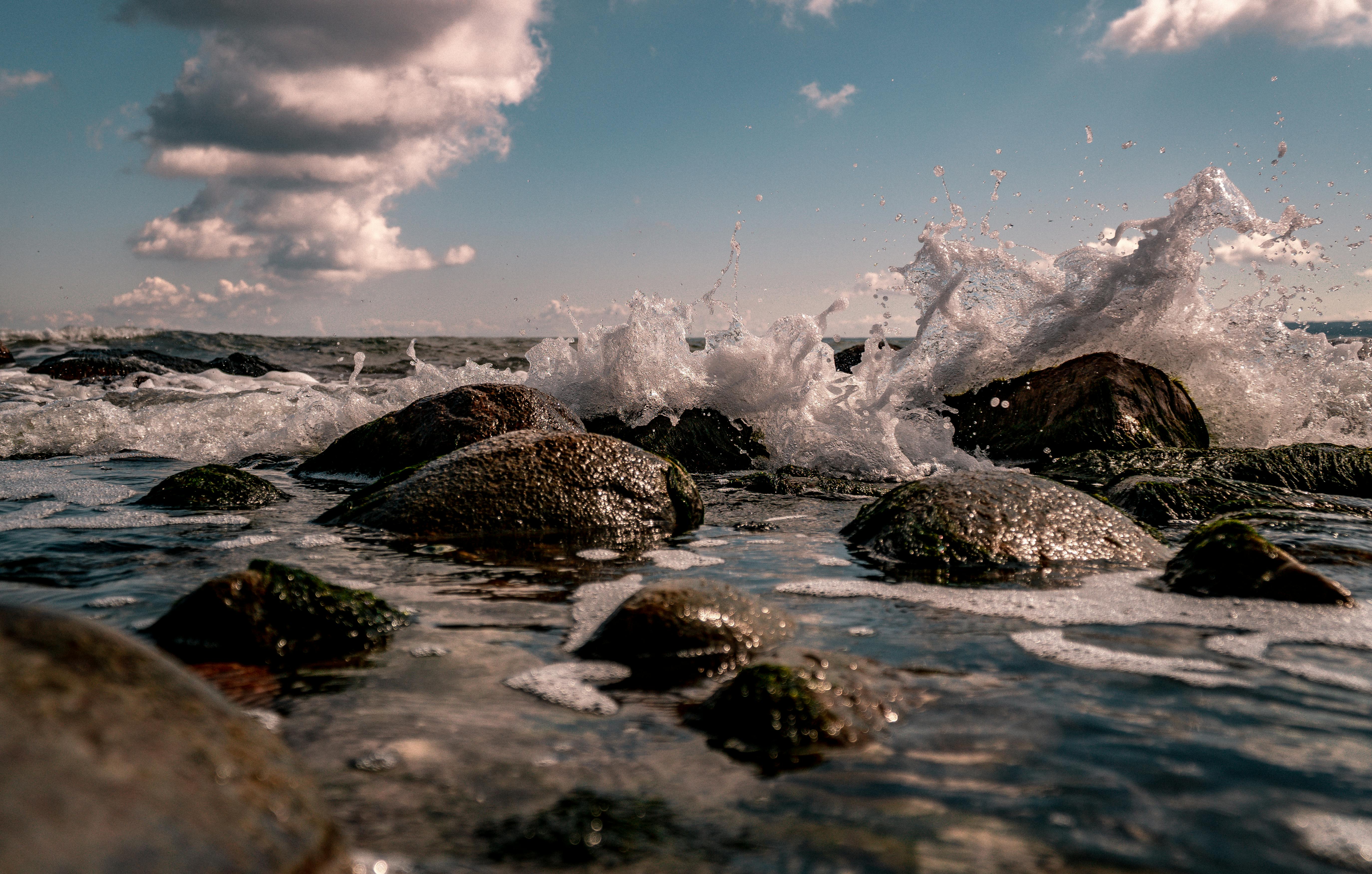 Sea Water Splashing On Rocks · Free Stock Photo