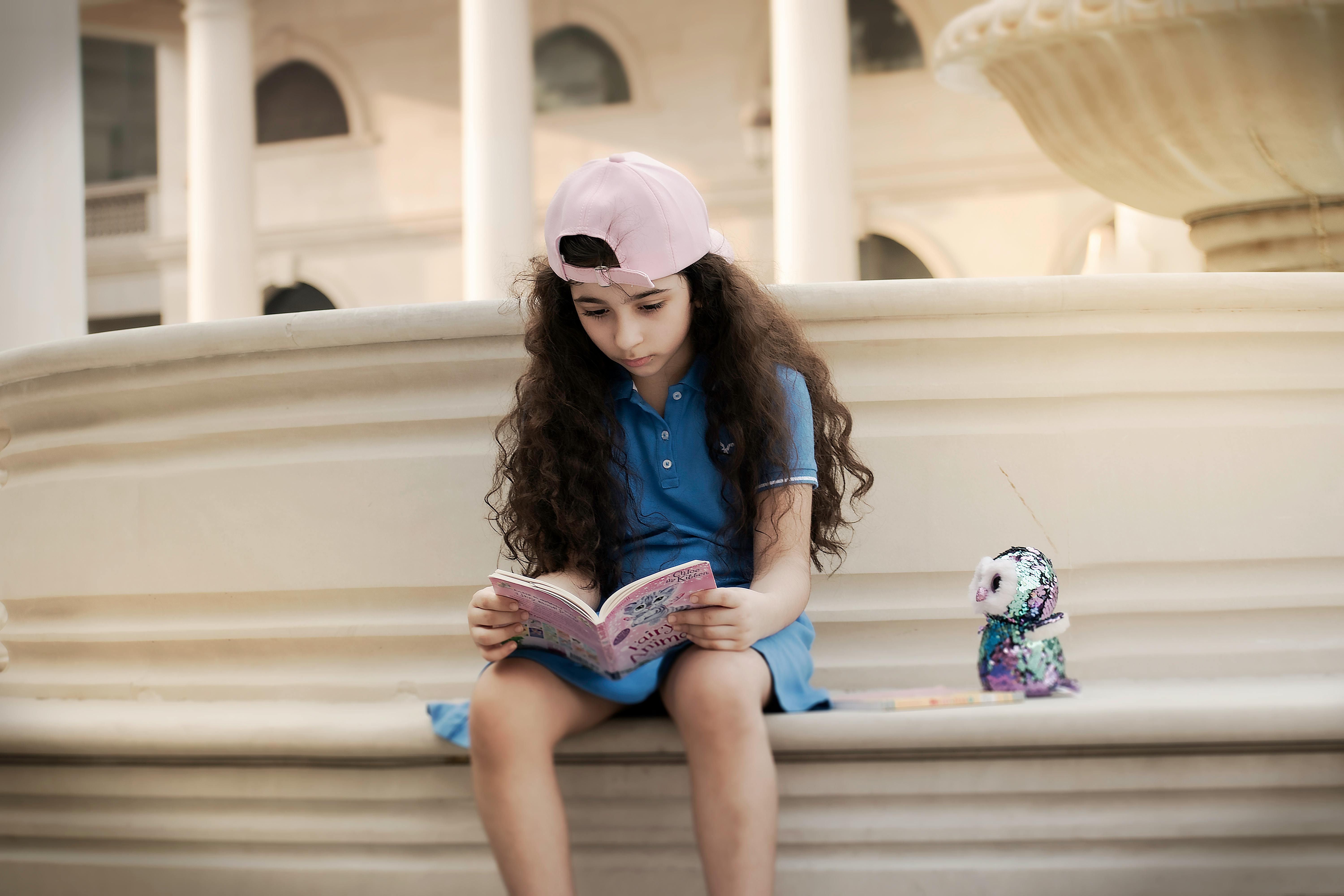 Photo Of Girl Reading Book · Free Stock Photo
