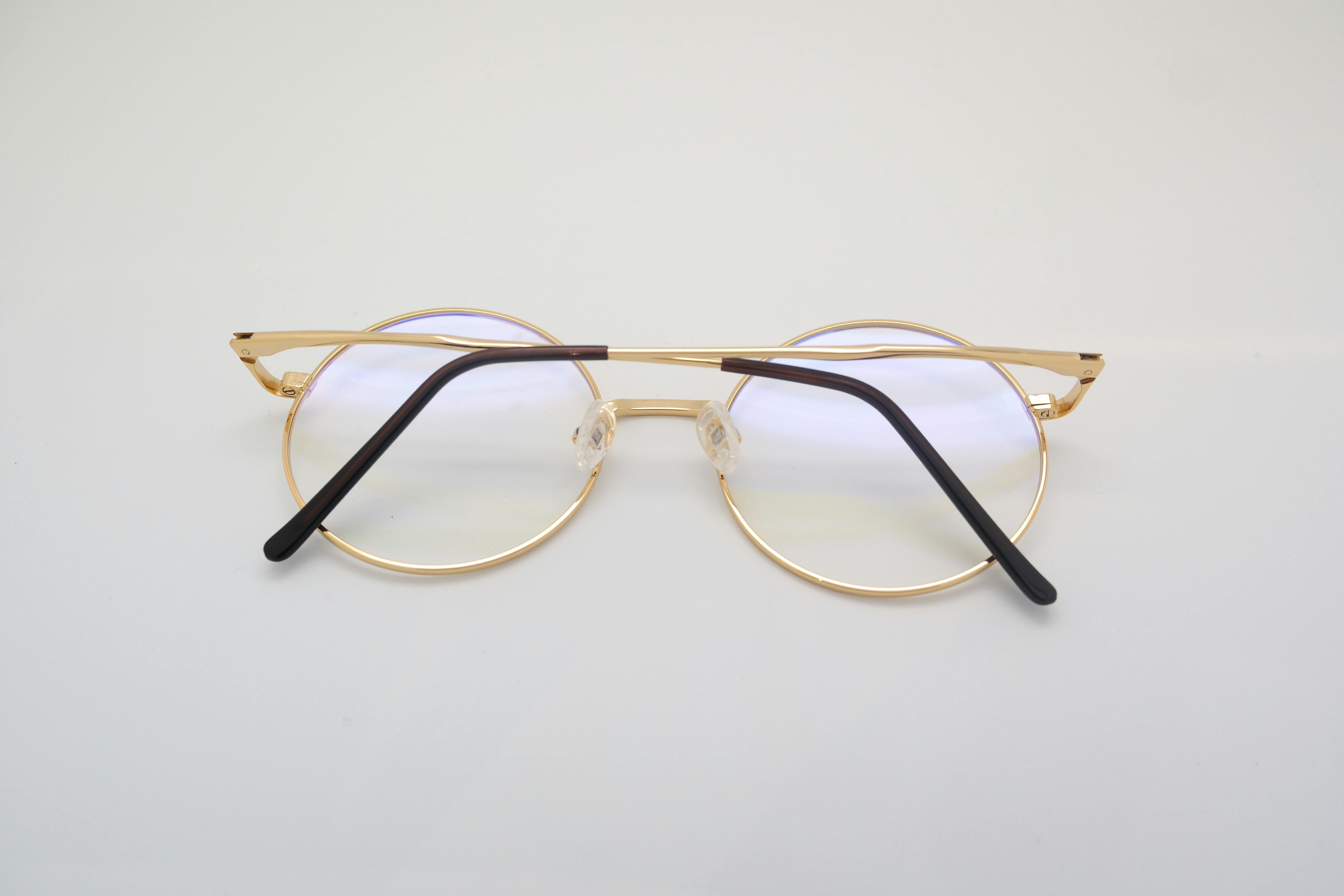 Gold Framed Eye Glasses · Free Stock Photo