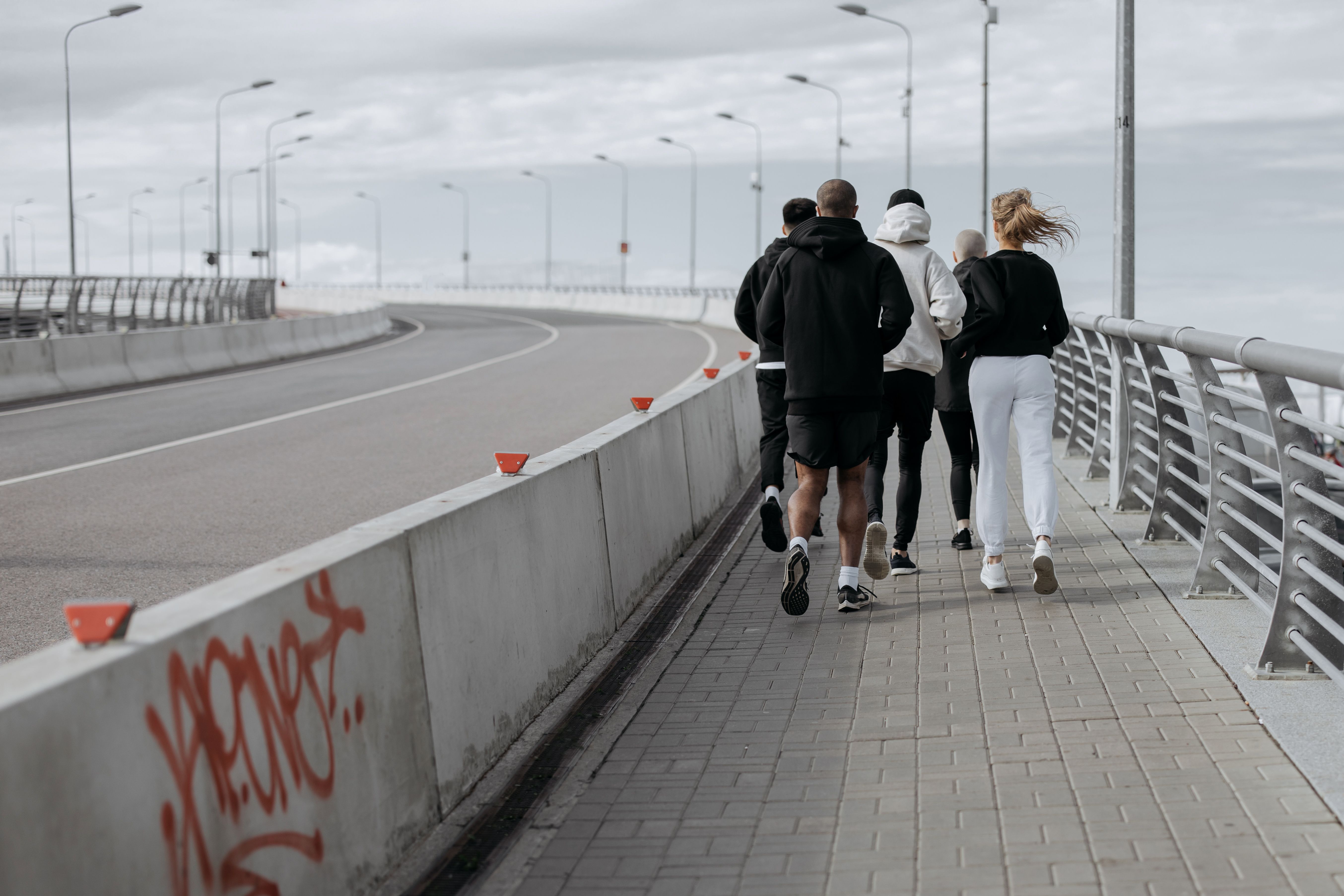 Woman Running Along Street · Free Stock Photo