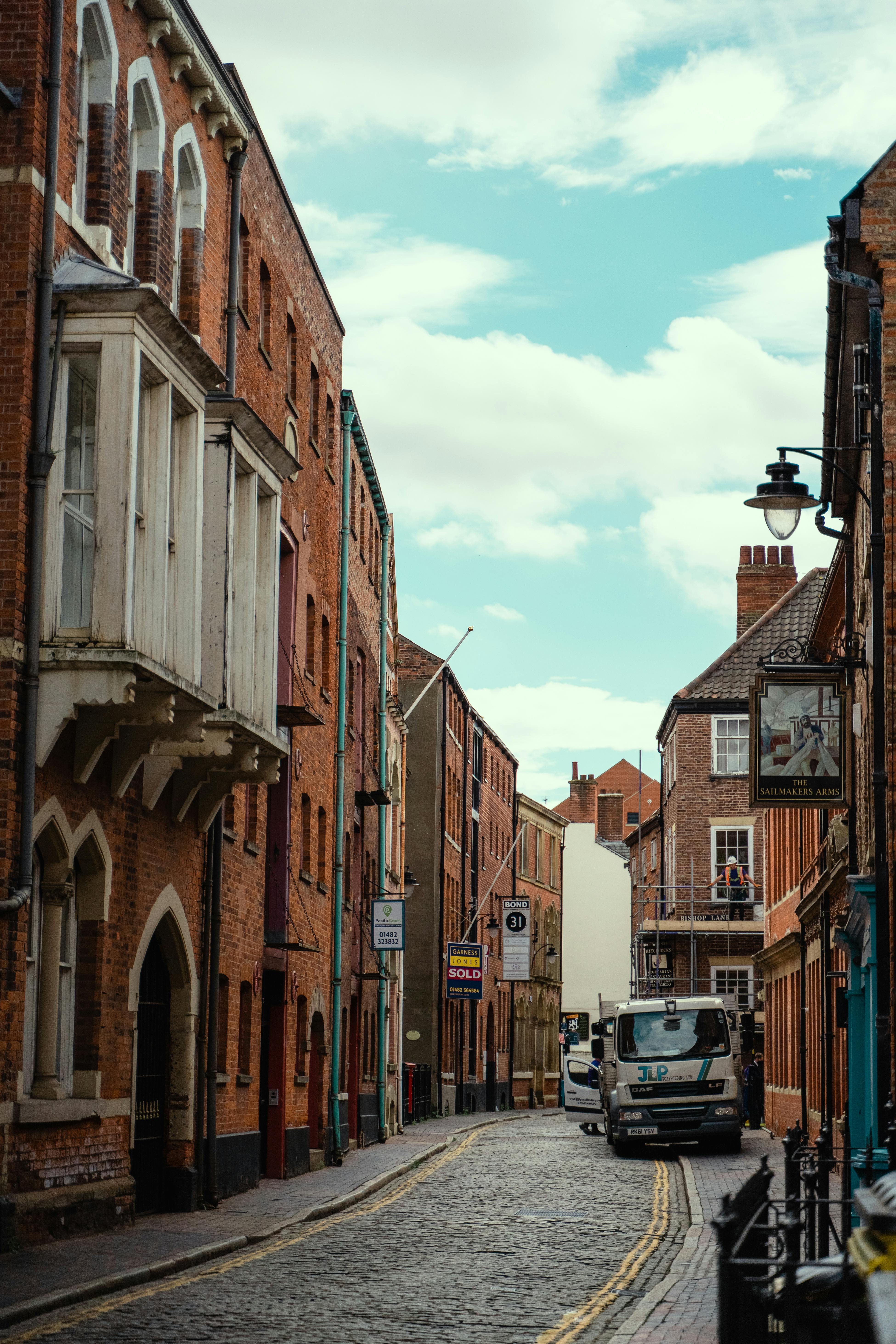 A Street with Parked Truck · Free Stock Photo