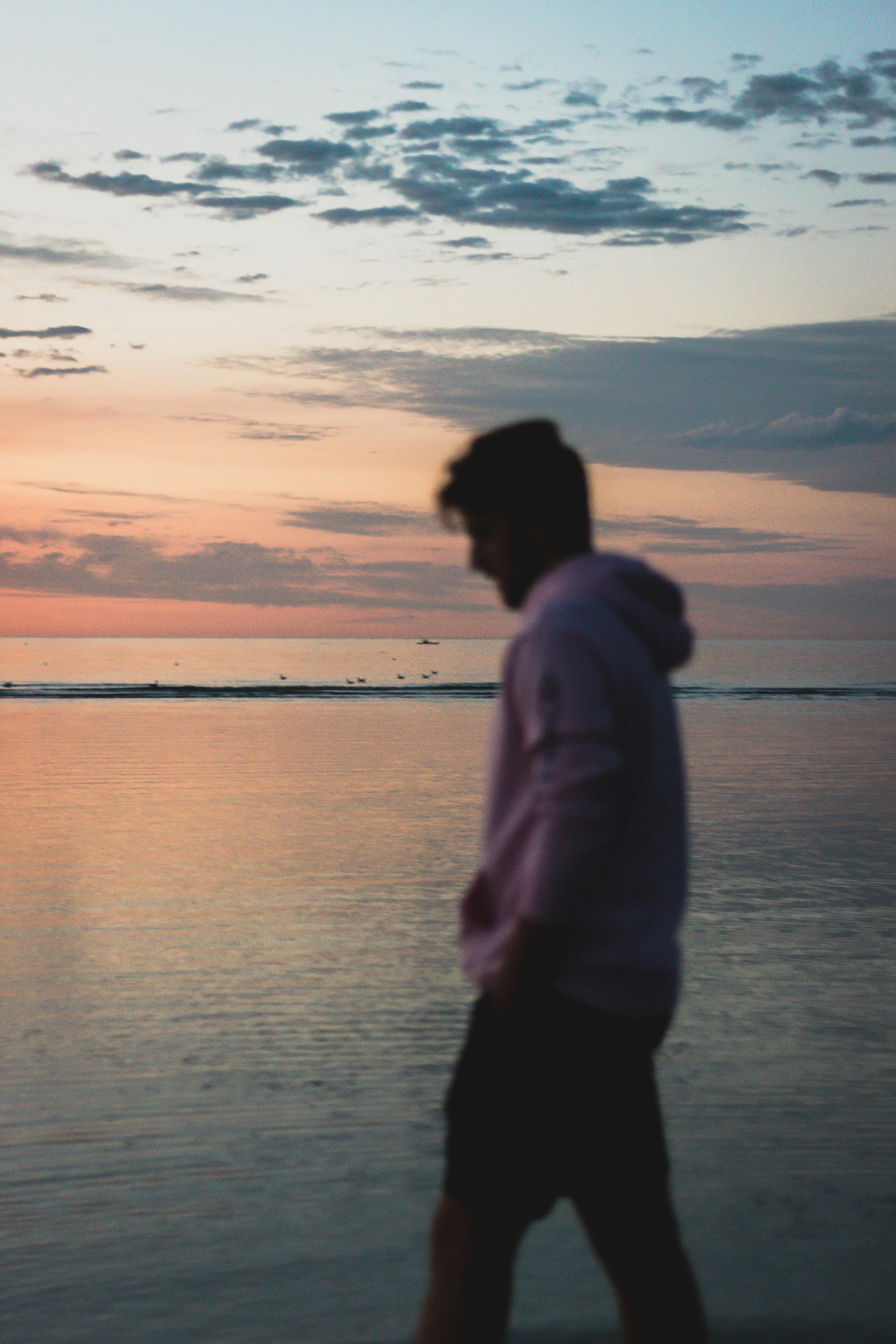 Happy black man near sea · Free Stock Photo